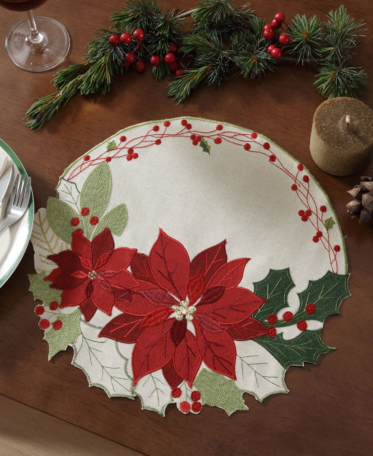 Click here for Elrene Poinsettia Cutwork Round Fabric Placemat  1... prices