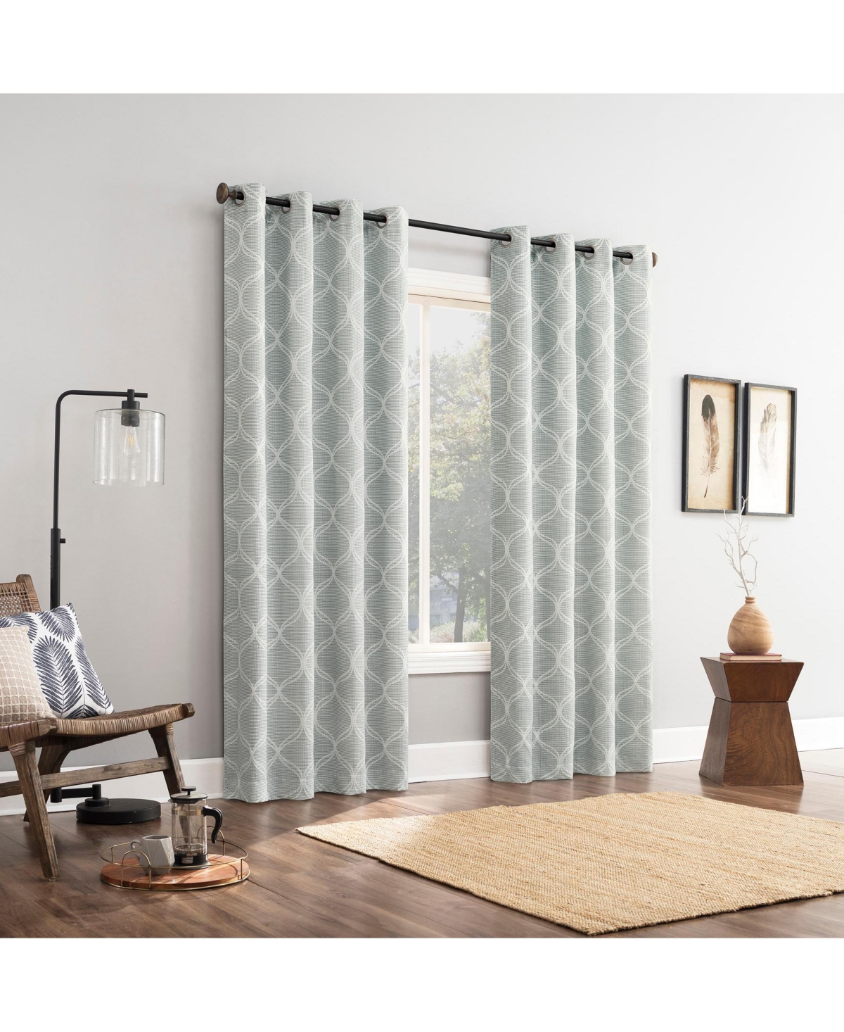 Click here for Sun Zero Tikal Woven Ogee 100 Blackout Grommet Cur... prices