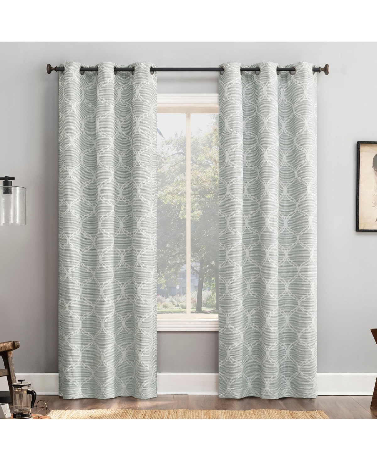 Click here for Sun Zero Tikal Woven Ogee 100 Blackout Grommet Cur... prices