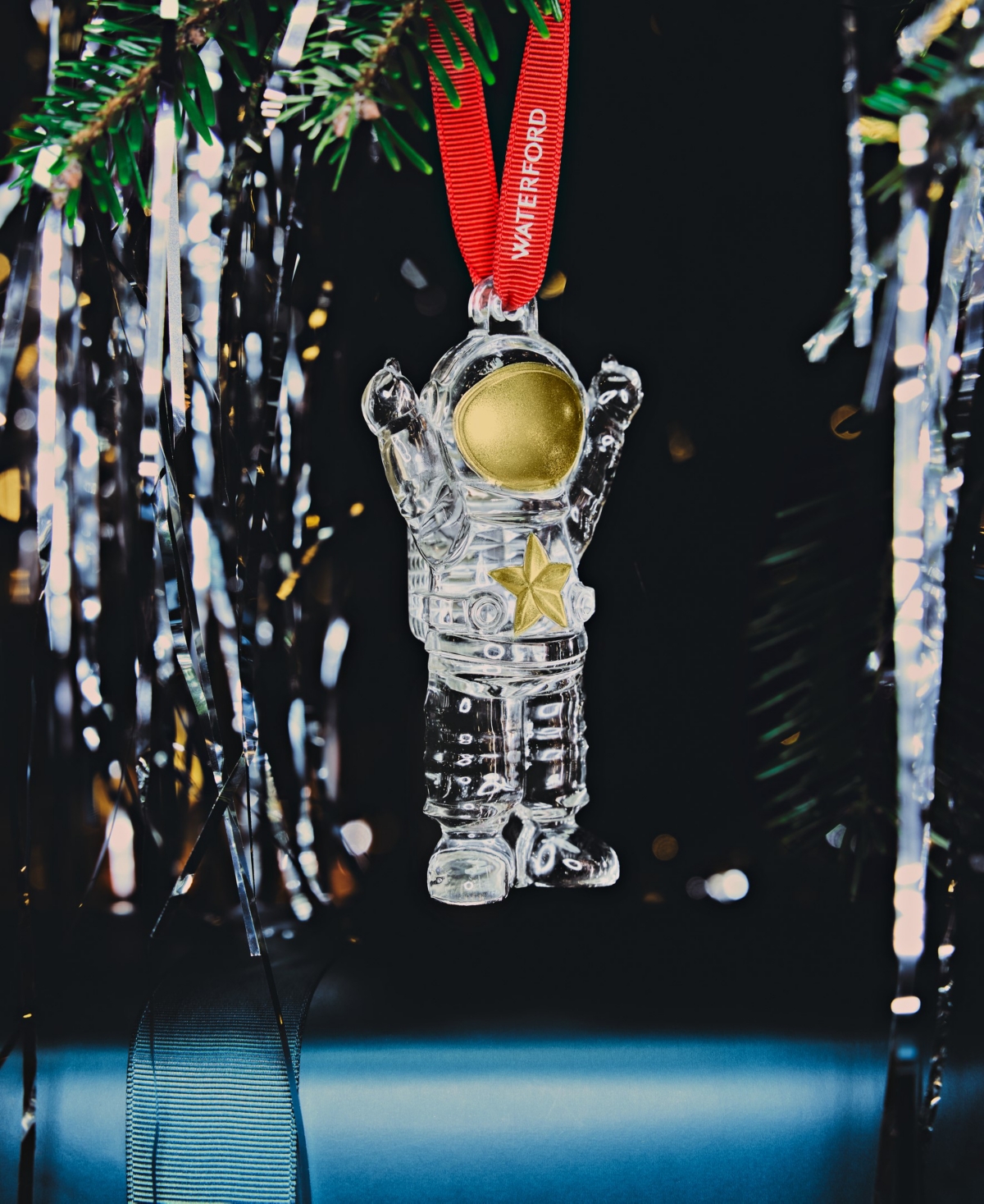 Click here for Waterford Elton John Rocket Man Ornament - Clear prices