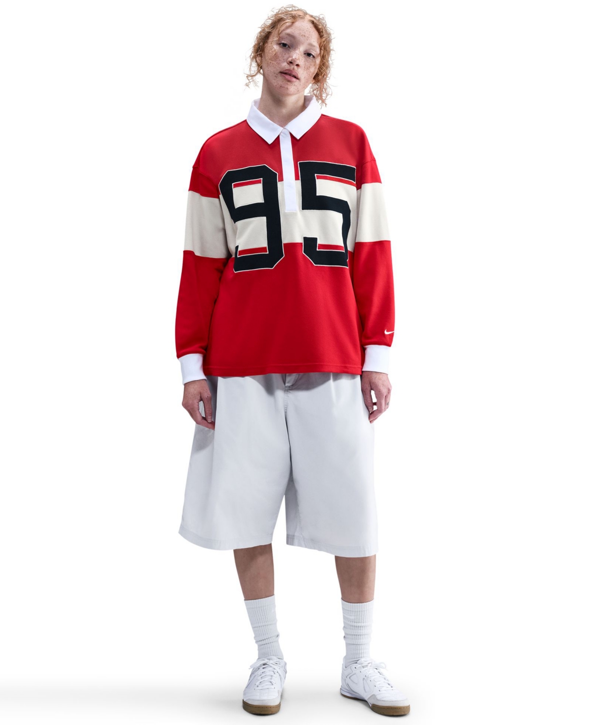 Click here for Nike Womens Sportswear Long-Sleeve Graphic Polo To... prices