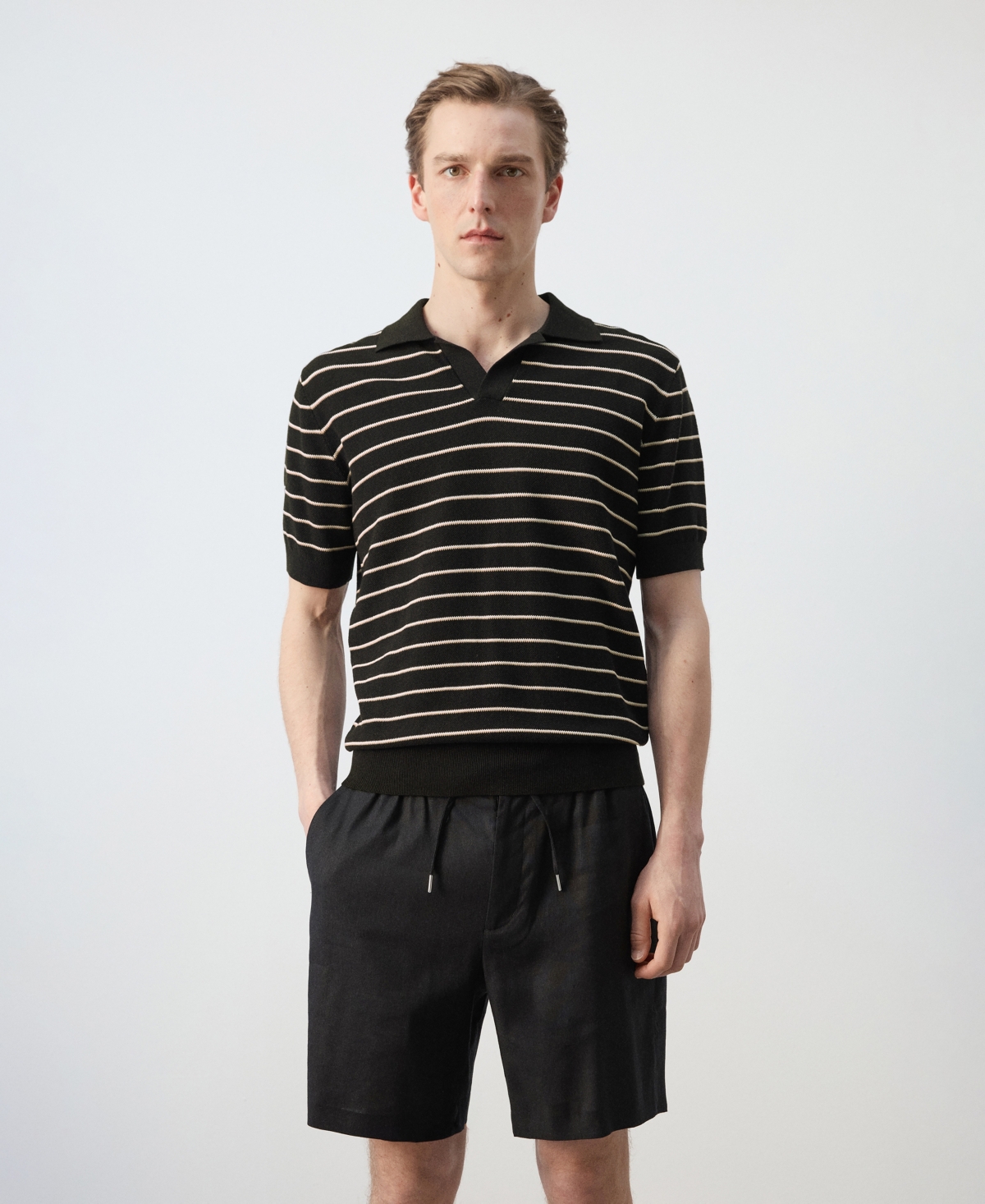 Click here for Mango Mens Striped Knit Cotton Polo Shirt - Black prices