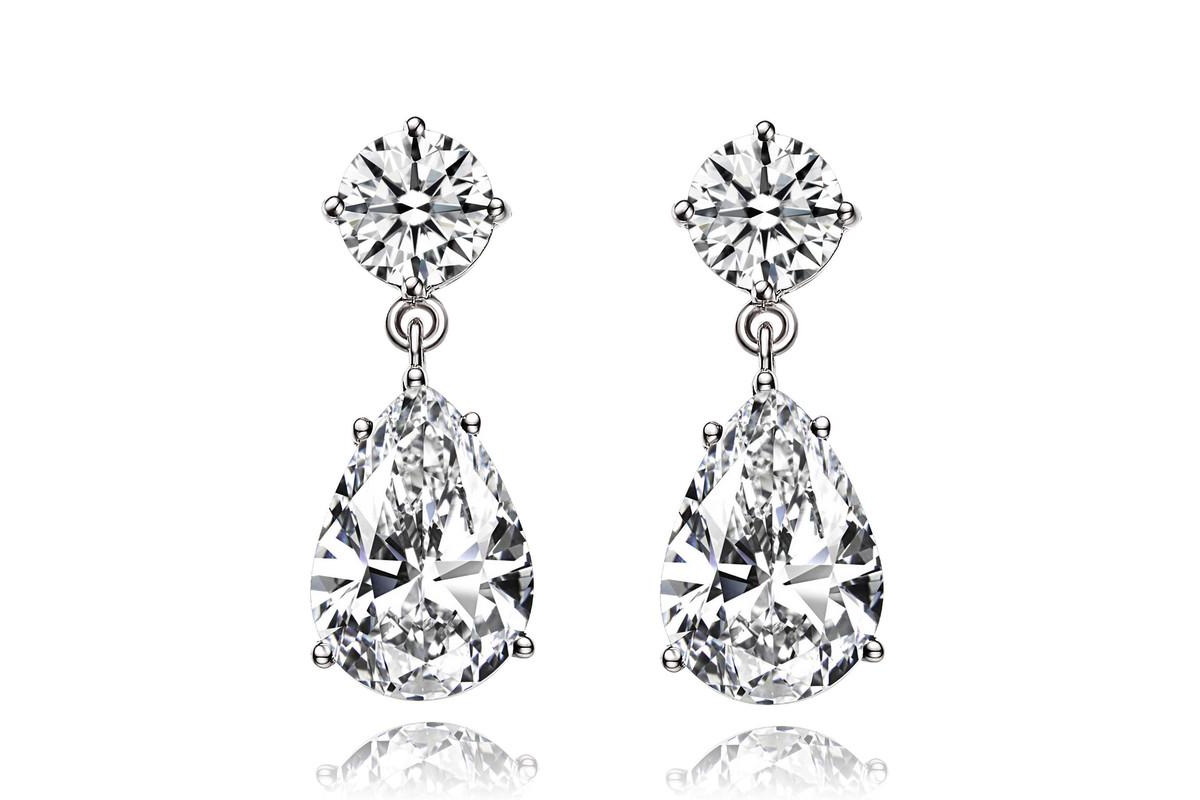 Click here for Sterling Silver Clear Cubic Zirconia Dangling Earr... prices