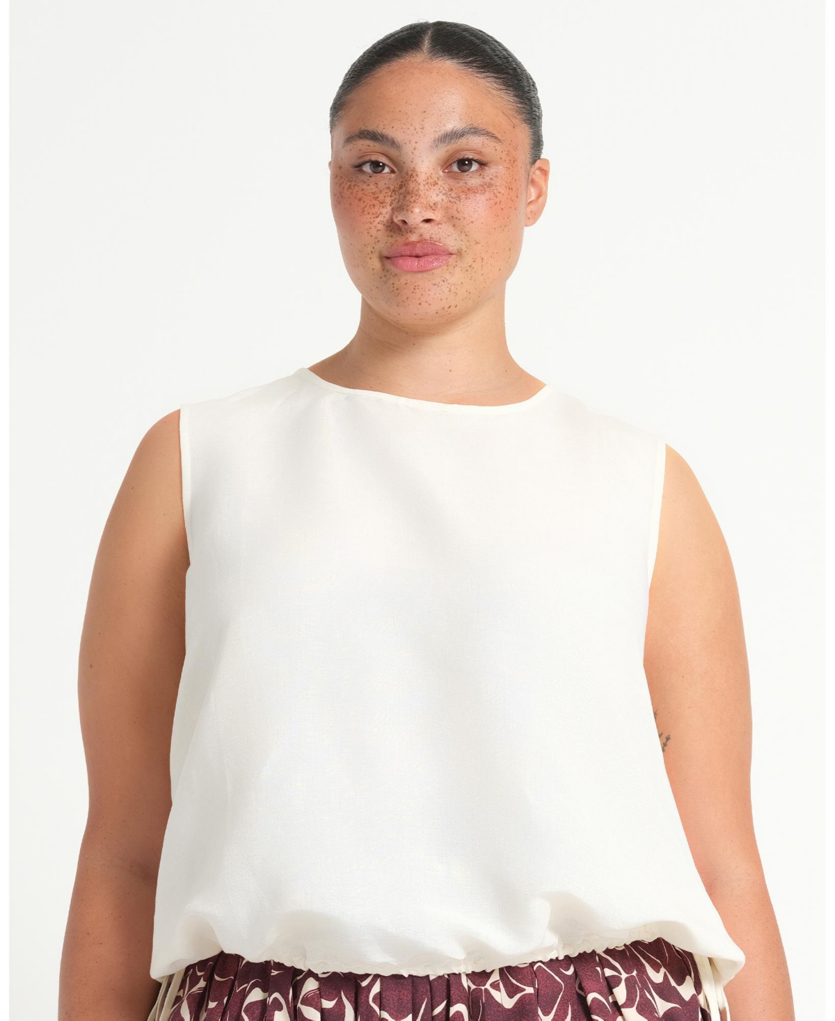 Click here for Estelle Plus Size Ainsley Tie-Hem Relaxed Tank Top... prices