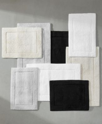 Click here for Calvin Klein Essence Solid Cotton Tufted Bath Rugs prices