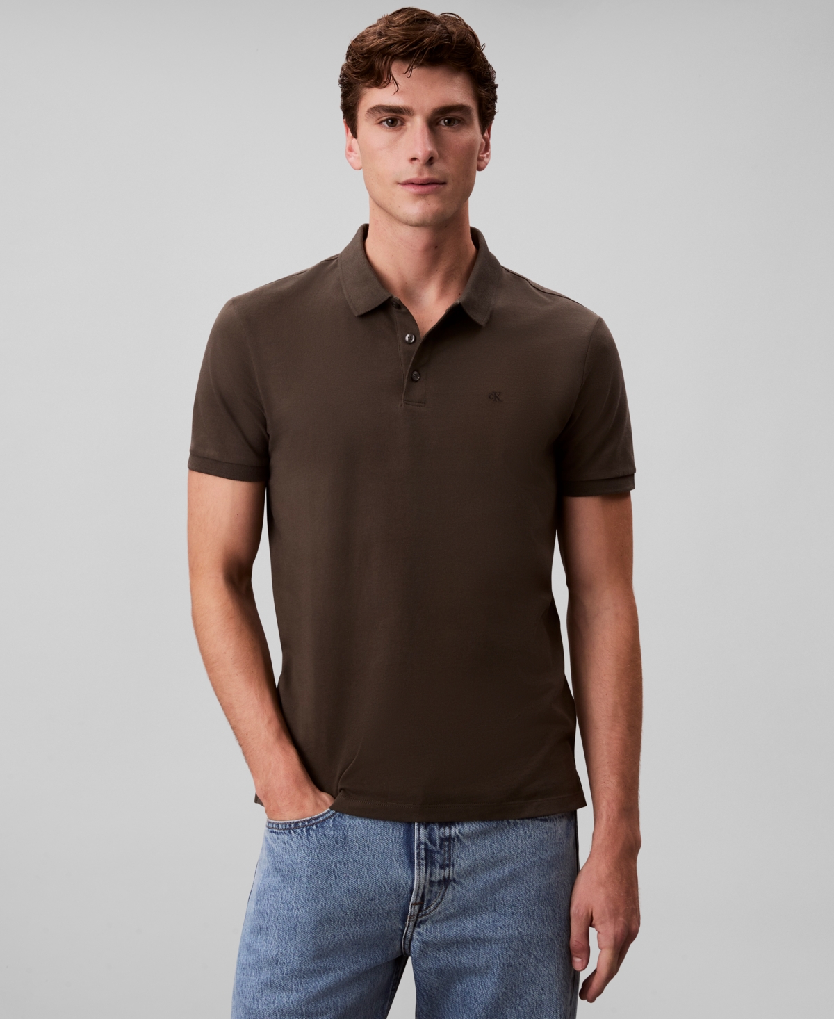 Click here for Calvin Klein Mens Short Sleeve Solid Polo Shirt -... prices