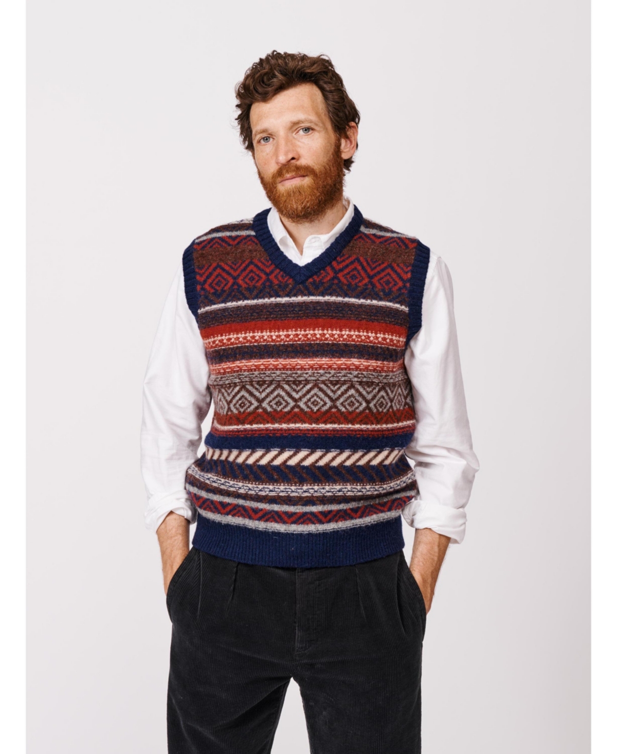 Click here for Aubin Fair Isle Slipover Wool Vest - Navy/red mix prices