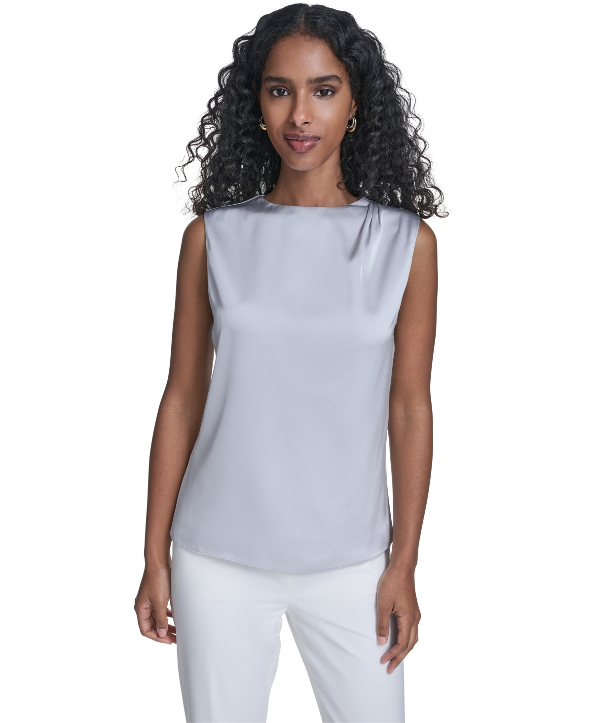 Click here for Calvin Klein Womens Solid Sleeveless Crewneck Top... prices