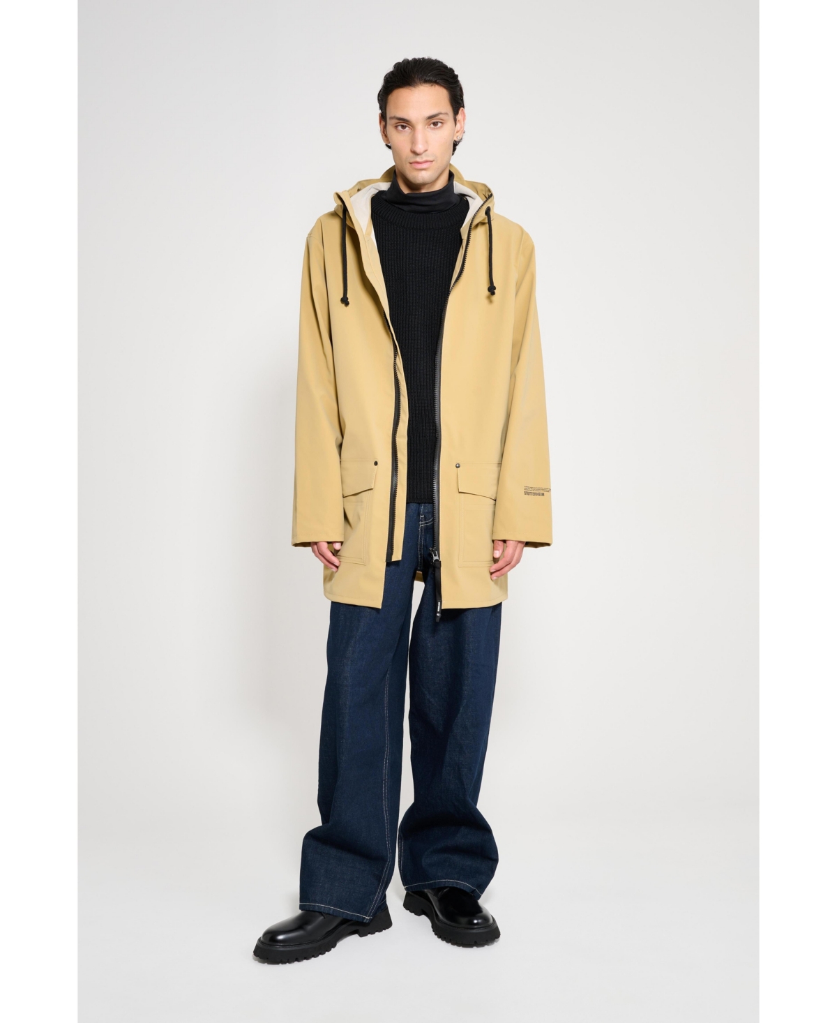 Click here for Stutterheim Mens Stockholm Patch Raincoat - Sand prices