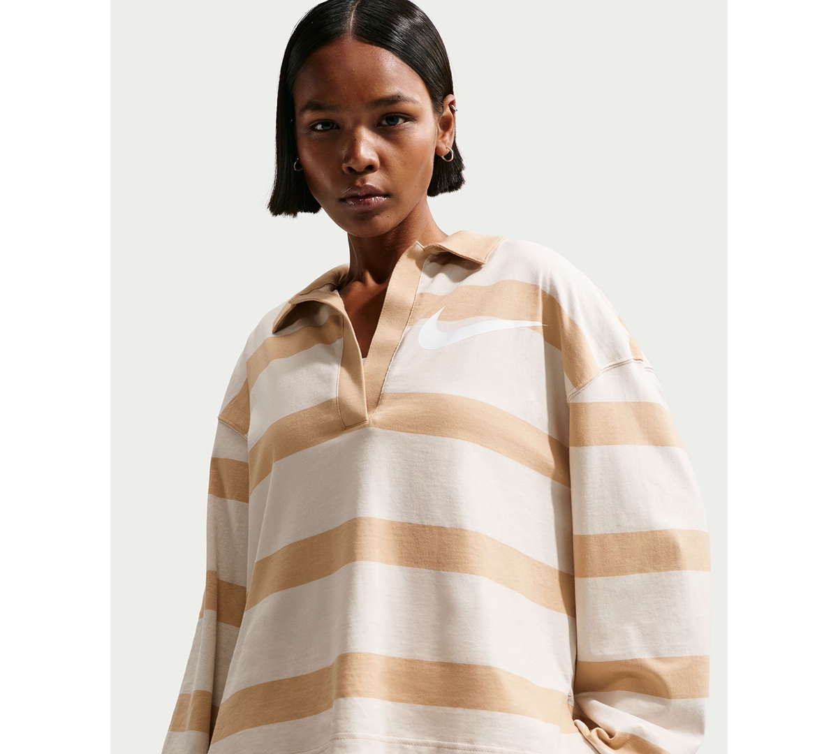 Click here for Nike Womens Sportswear Oversized Collared Neck Top... prices