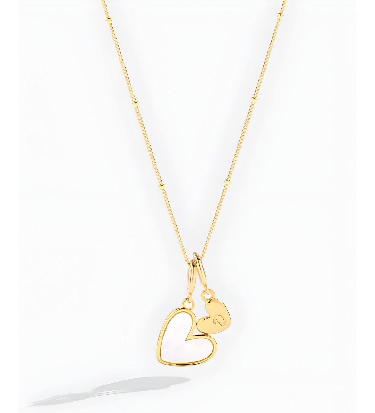 Click here for Mint & Lily Mother Of Pearl Heart Initial Necklace... prices