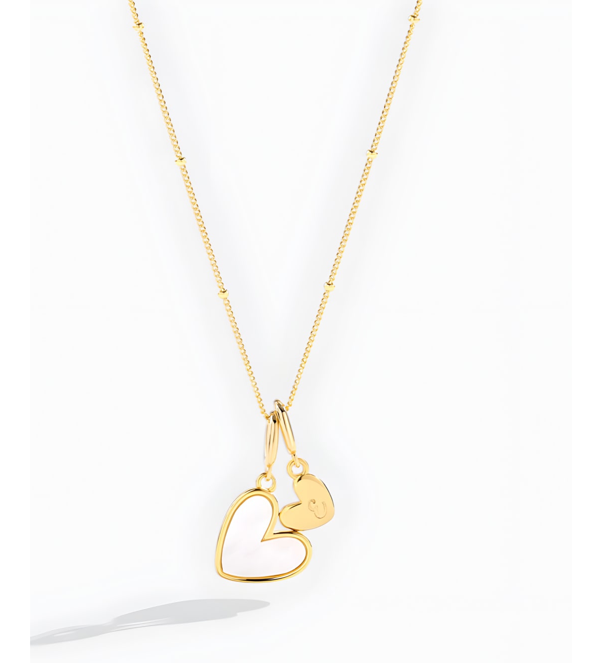 Click here for Mint & Lily Mother Of Pearl Heart Initial Necklace... prices