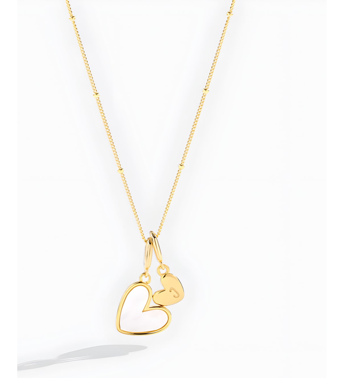 Click here for Mint & Lily Mother Of Pearl Heart Initial Necklace... prices