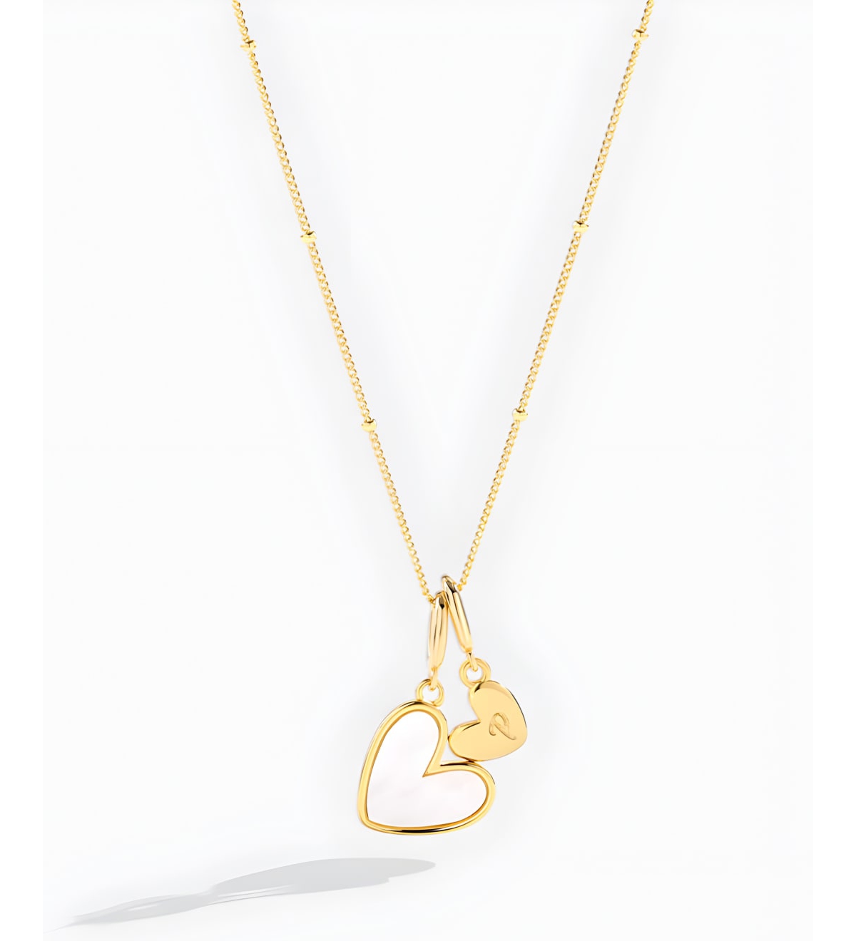 Click here for Mint & Lily Mother Of Pearl Heart Initial Necklace... prices