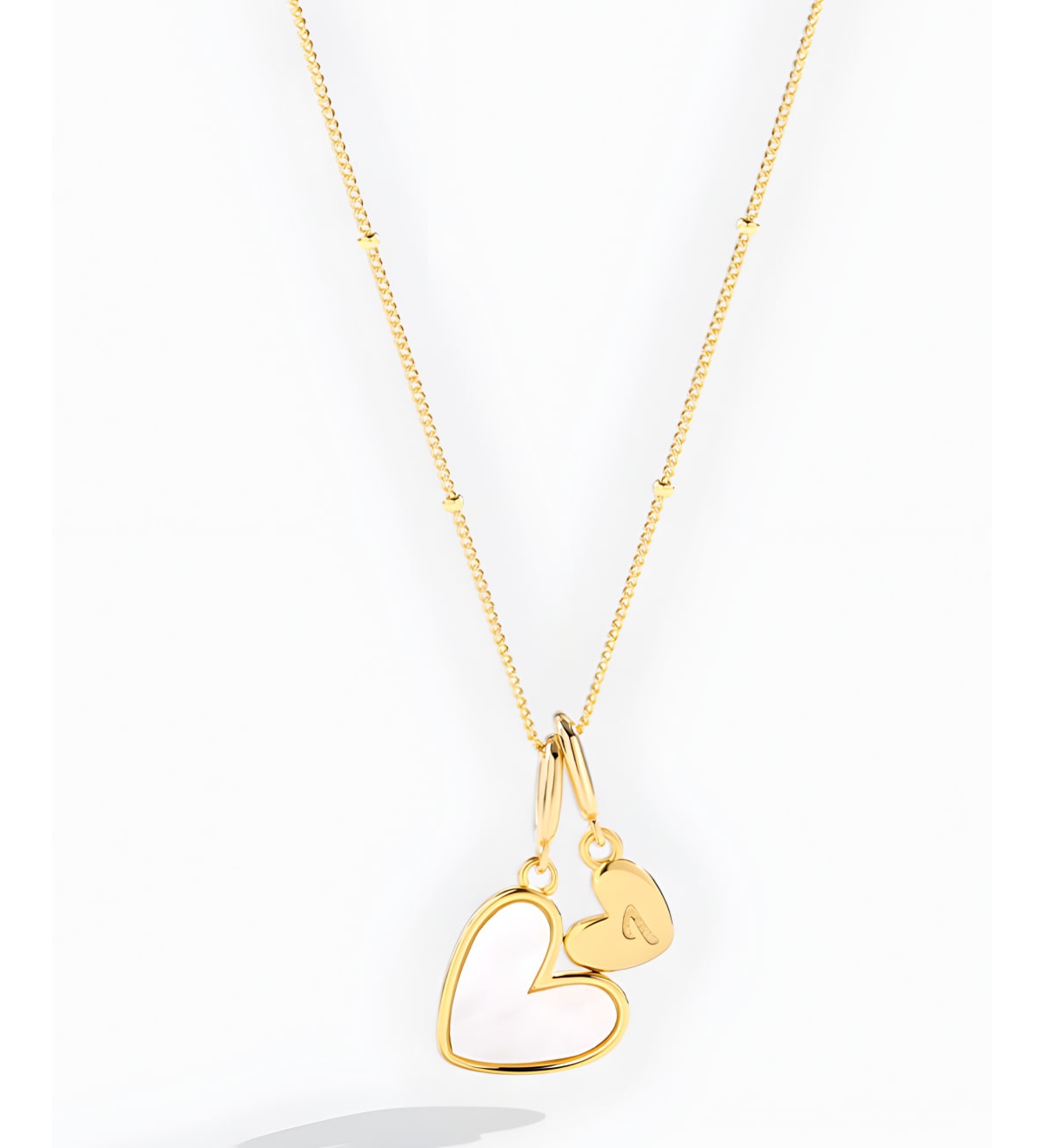 Click here for Mint & Lily Mother Of Pearl Heart Initial Necklace... prices