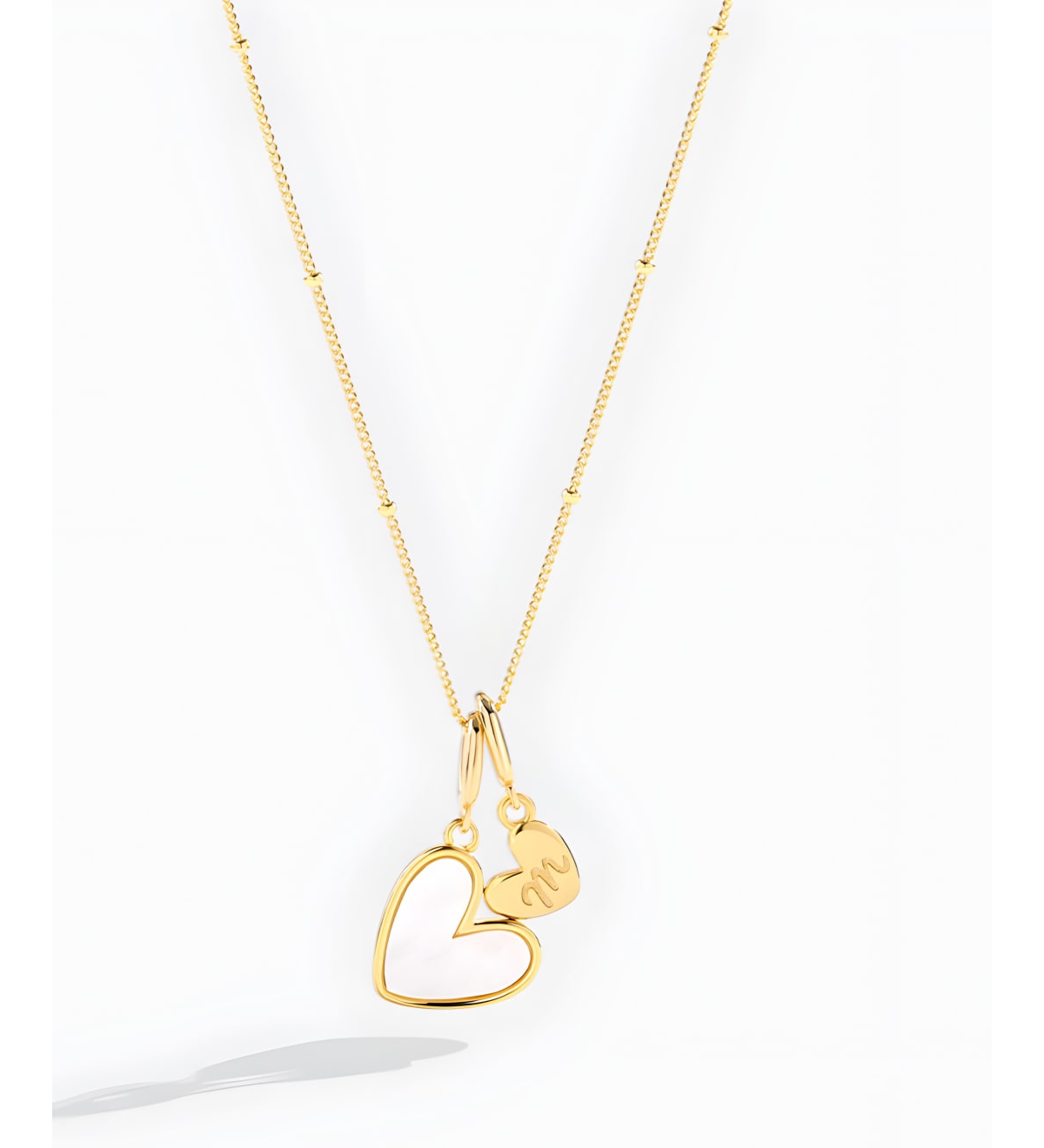 Click here for Mint & Lily Mother Of Pearl Heart Initial Necklace... prices