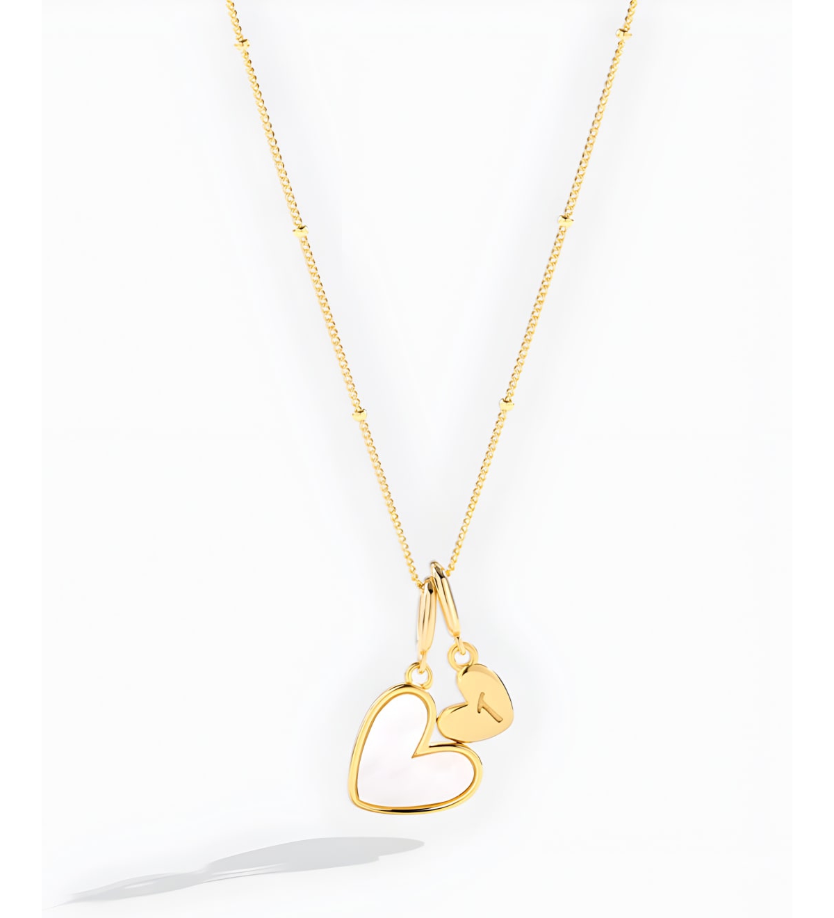 Click here for Mint & Lily Mother Of Pearl Heart Initial Necklace... prices