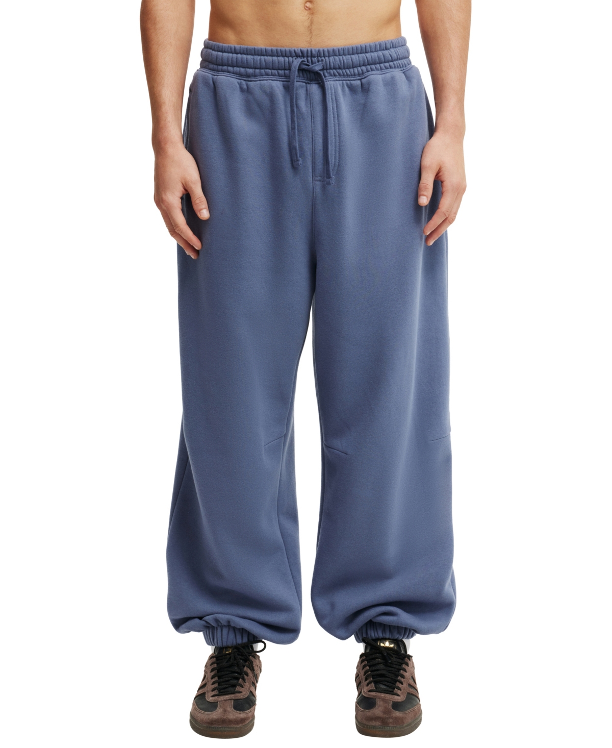 Click here for Cotton On Mens Cuffed Baggy-Fit Track Pants - Blue prices
