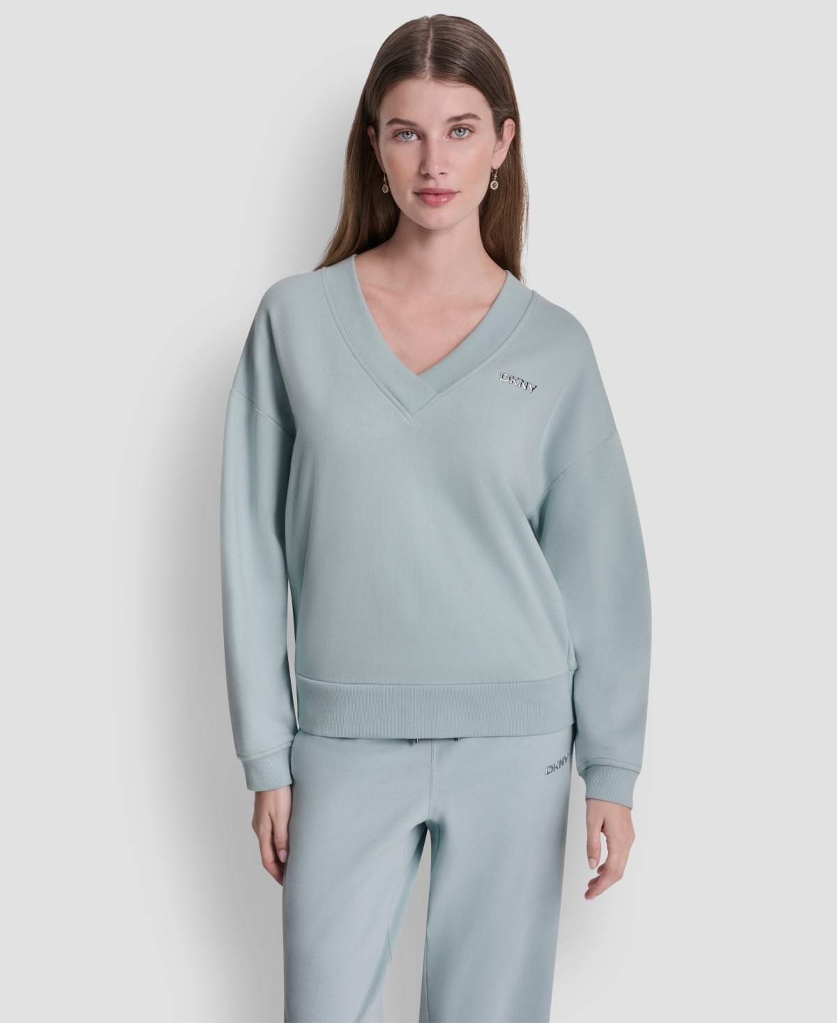 Click here for Dkny Sport Womens Metallic Bubble Logo V-Neck Swea... prices