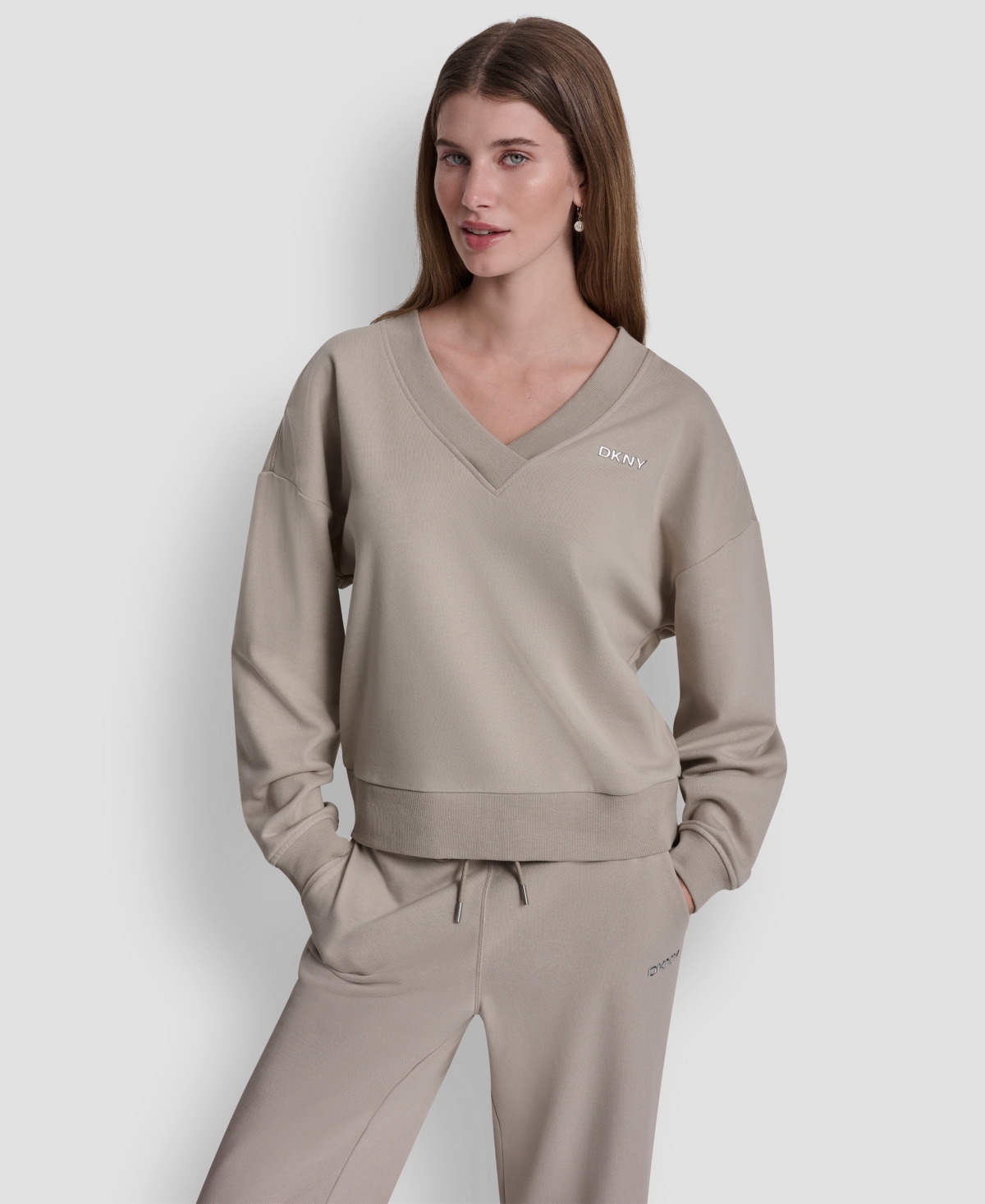 Click here for Dkny Sport Womens Metallic Bubble Logo V-Neck Swea... prices