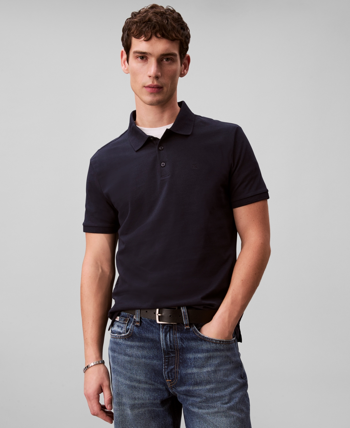 Click here for Calvin Klein Mens Short Sleeve Solid Polo Shirt -... prices