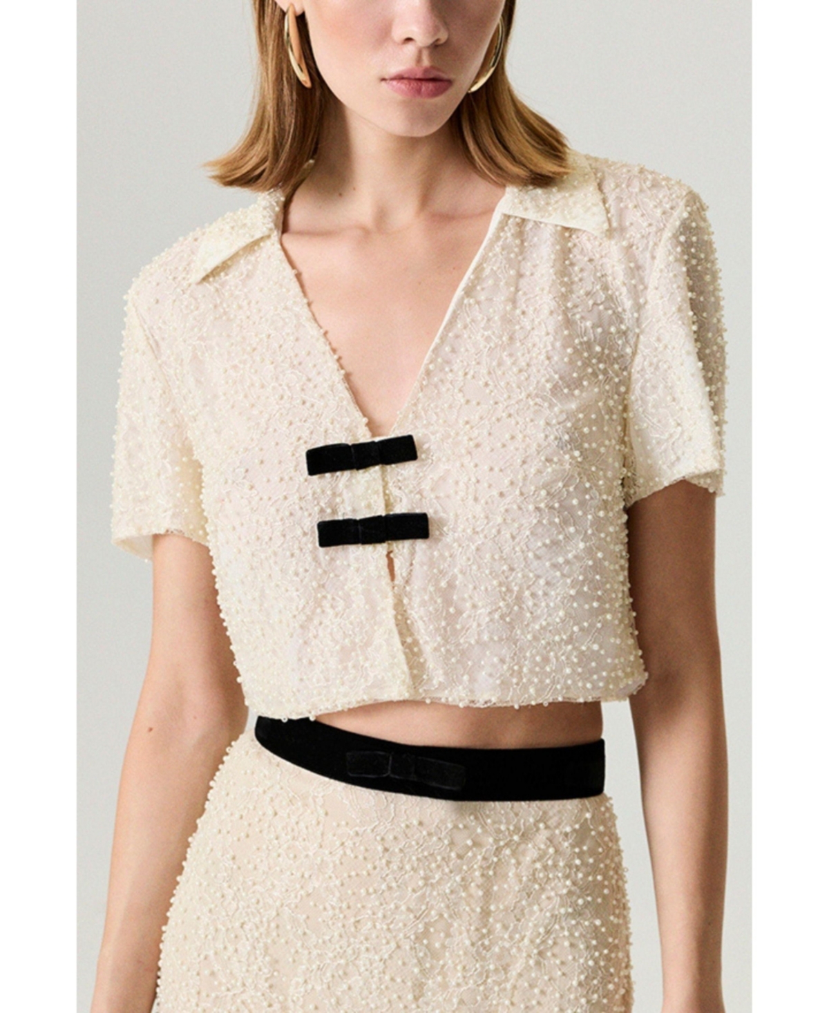 Click here for Nocturne Womens Pearl Embellished Bow Crop Blouse... prices