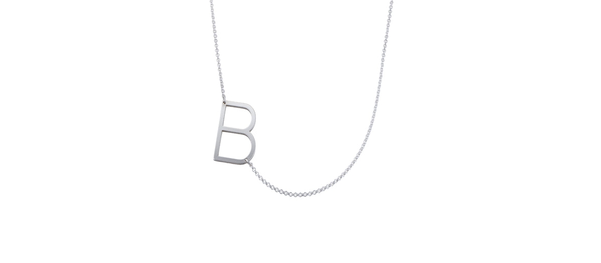 Click here for Oak & Luna Sideways Initial Necklace in Sterling S... prices