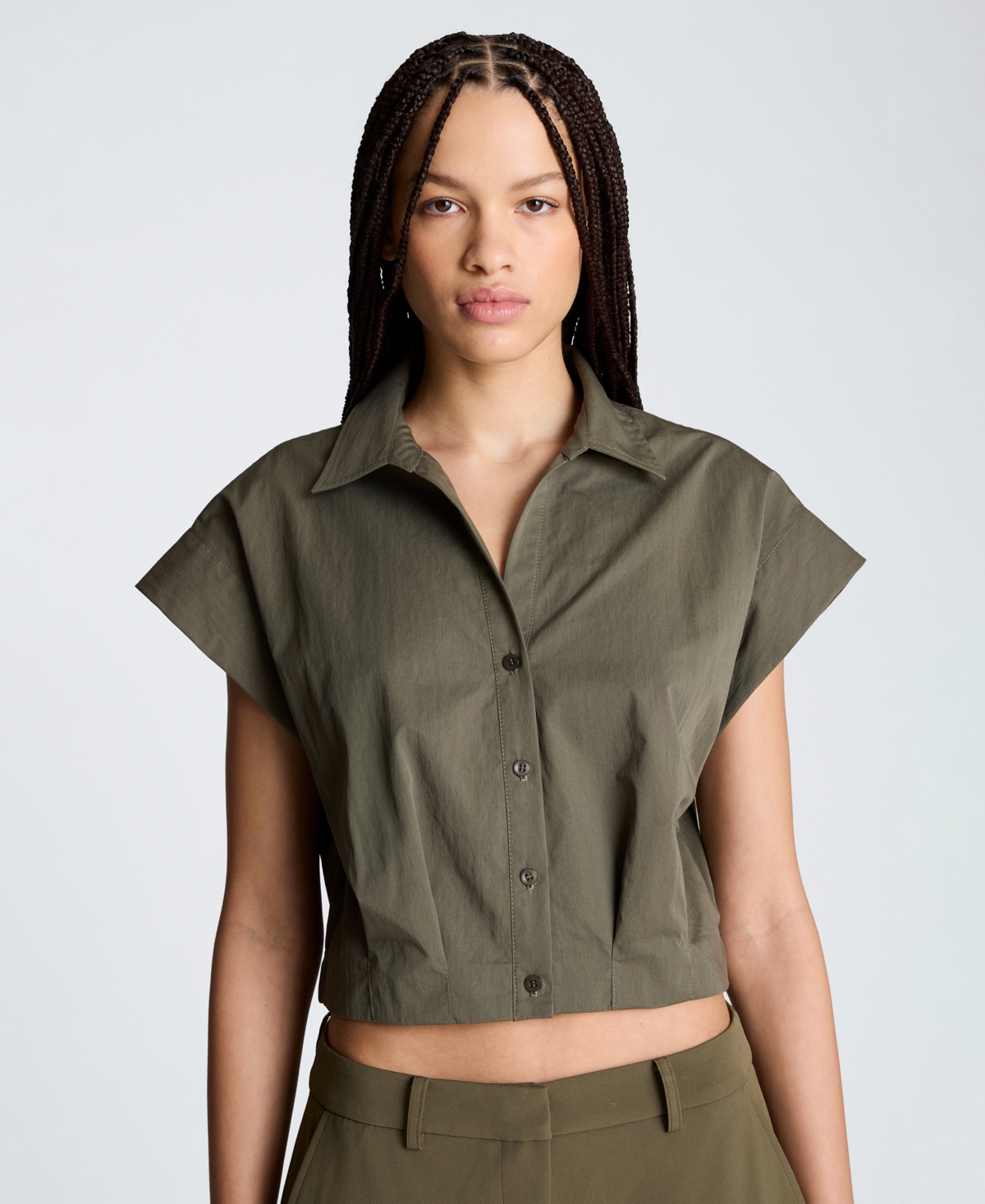 Click here for Kenneth Cole Womens Y-Neck Crop Top - Turtle Green prices