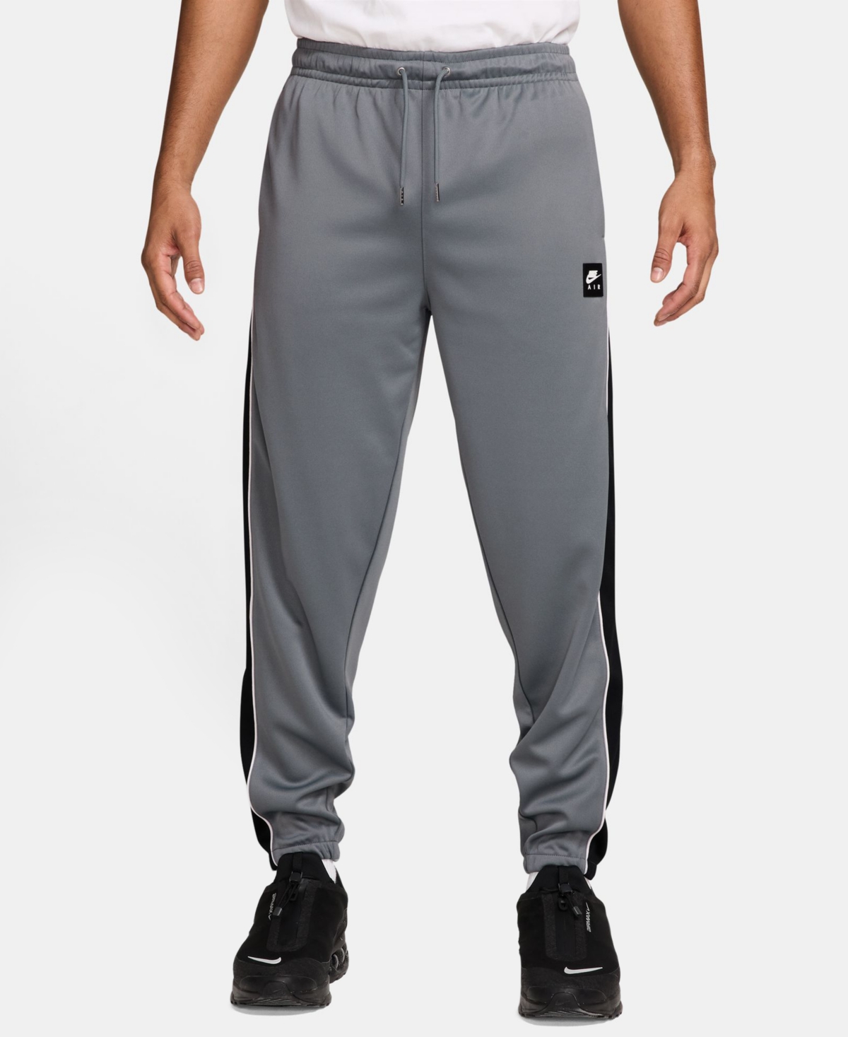 Click here for Nike Mens Slim-Fit Knit Pants - Smoke Gray/Black prices