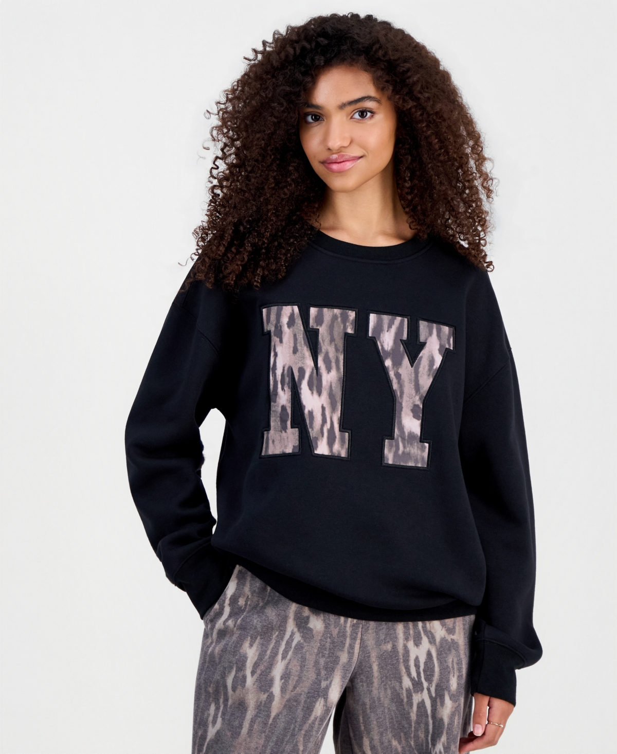 Click here for Madden Girl Juniors Animal Print Ny Sweatshirt - B... prices