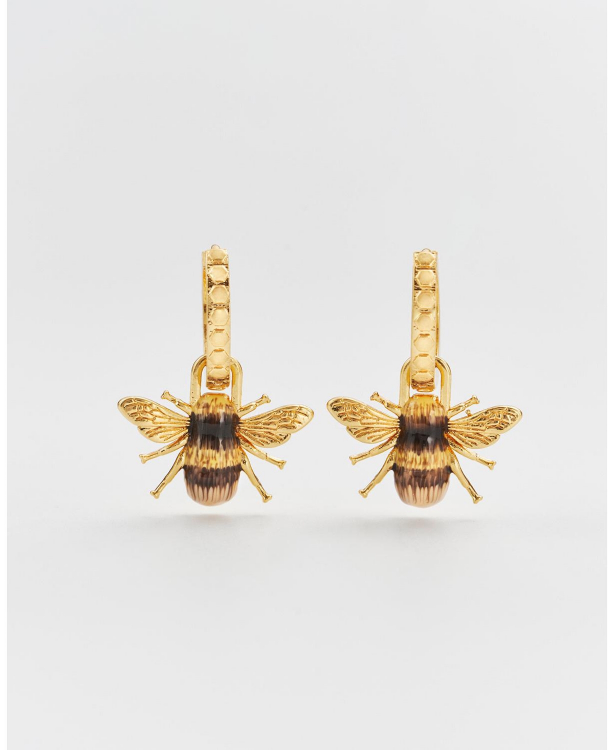 Click here for Fable England Honey Bee Huggie Earrings - Gold prices
