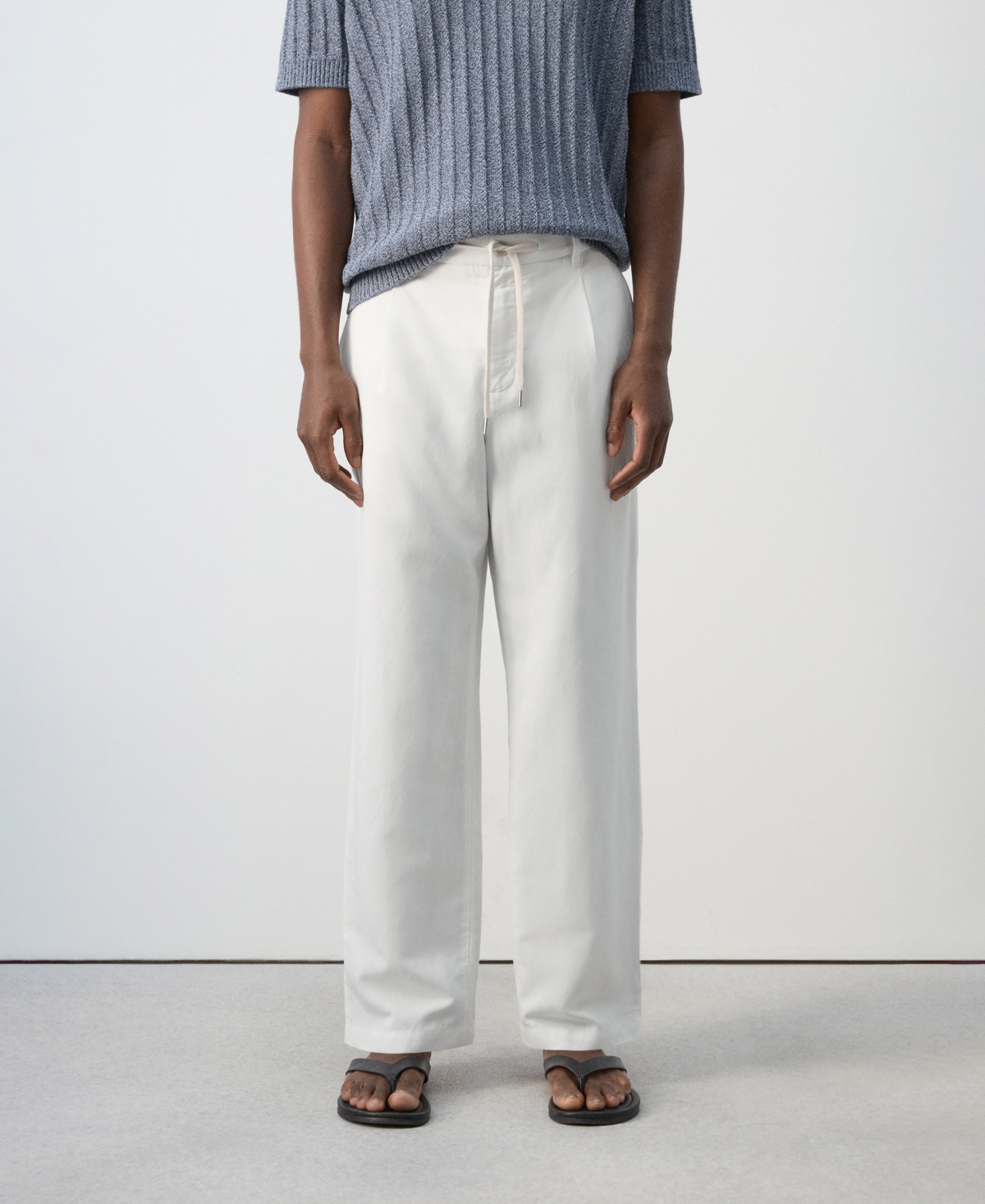 Click here for Mango Mens Regular-Fit Lyocell Linen Pants - White prices