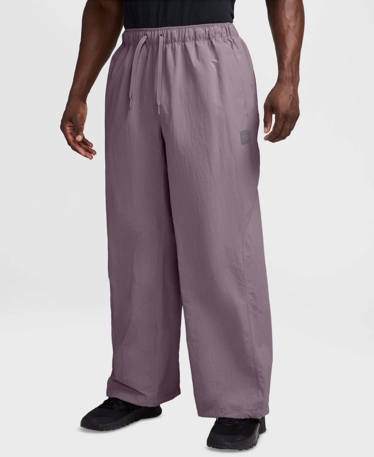 Click here for Nike Mens N.a.c. Dri-fit Oversized Woven Pants - P... prices