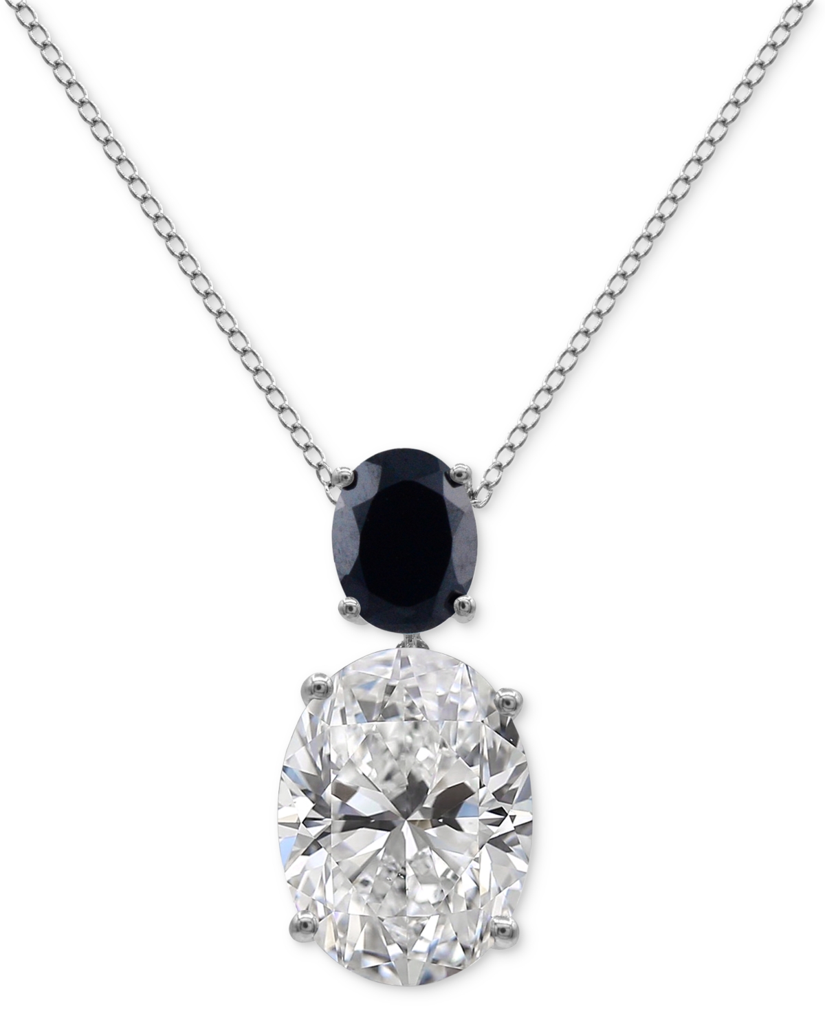 Click here for White Quartz 7-3/4 ct. t.w. Black Onyx 9 X 7 Mm Ov... prices