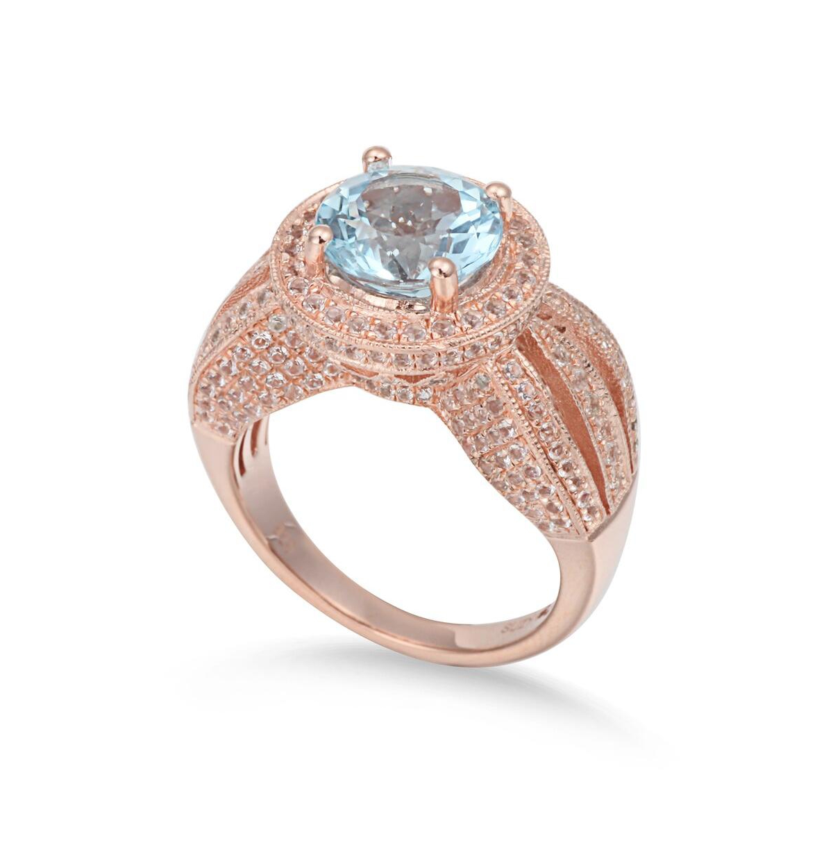 Click here for Suzy Levian Sterling Silver Round Cut Center Topaz... prices