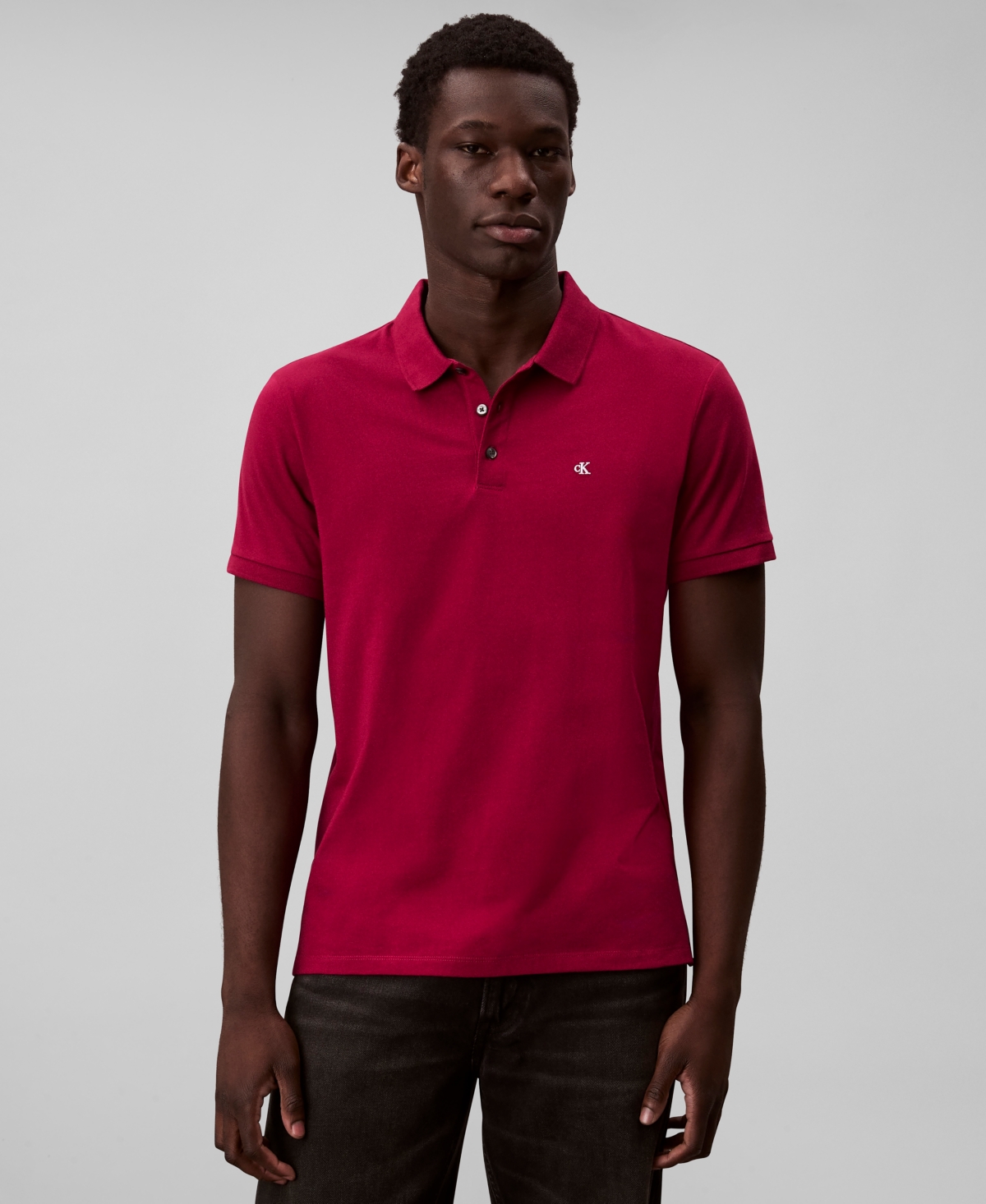 Click here for Calvin Klein Mens Short Sleeve Solid Polo Shirt -... prices