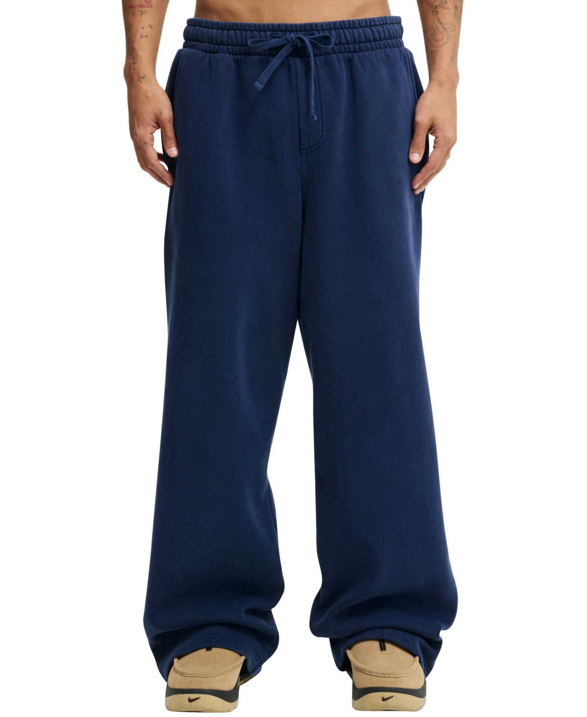 Click here for Cotton On Mens Super Baggy Track Pant - Blue prices