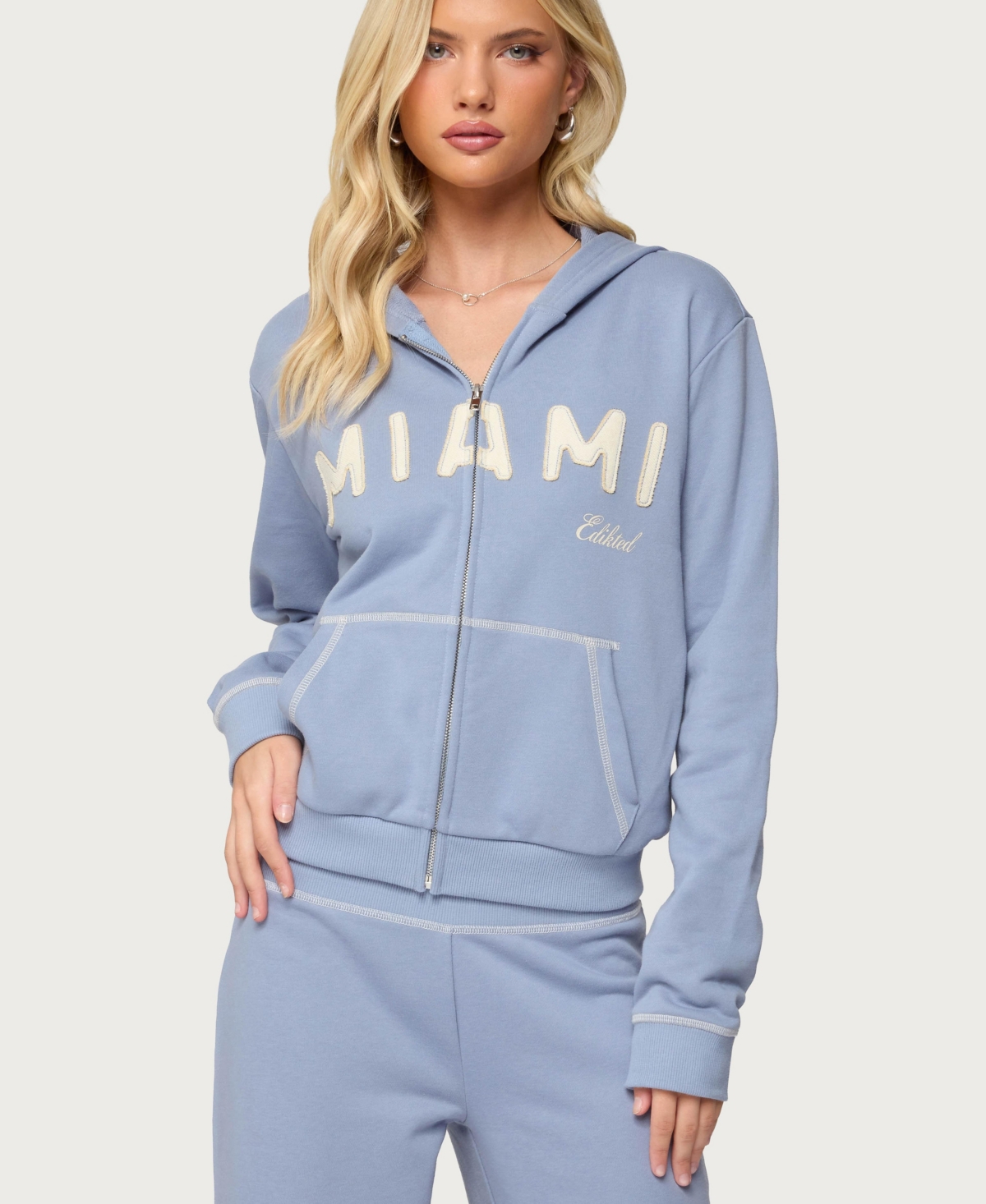 Click here for Edikted Womens Miami Babe Zip Up Hoodie - Blue prices