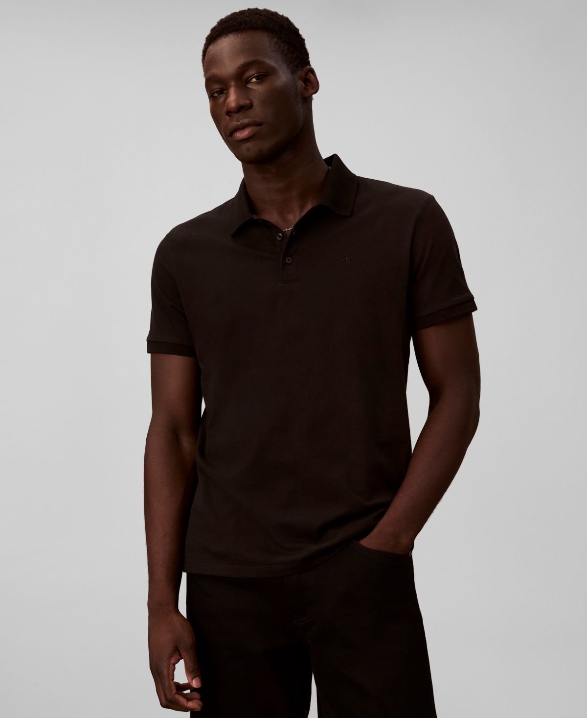 Click here for Calvin Klein Mens Short Sleeve Solid Polo Shirt -... prices