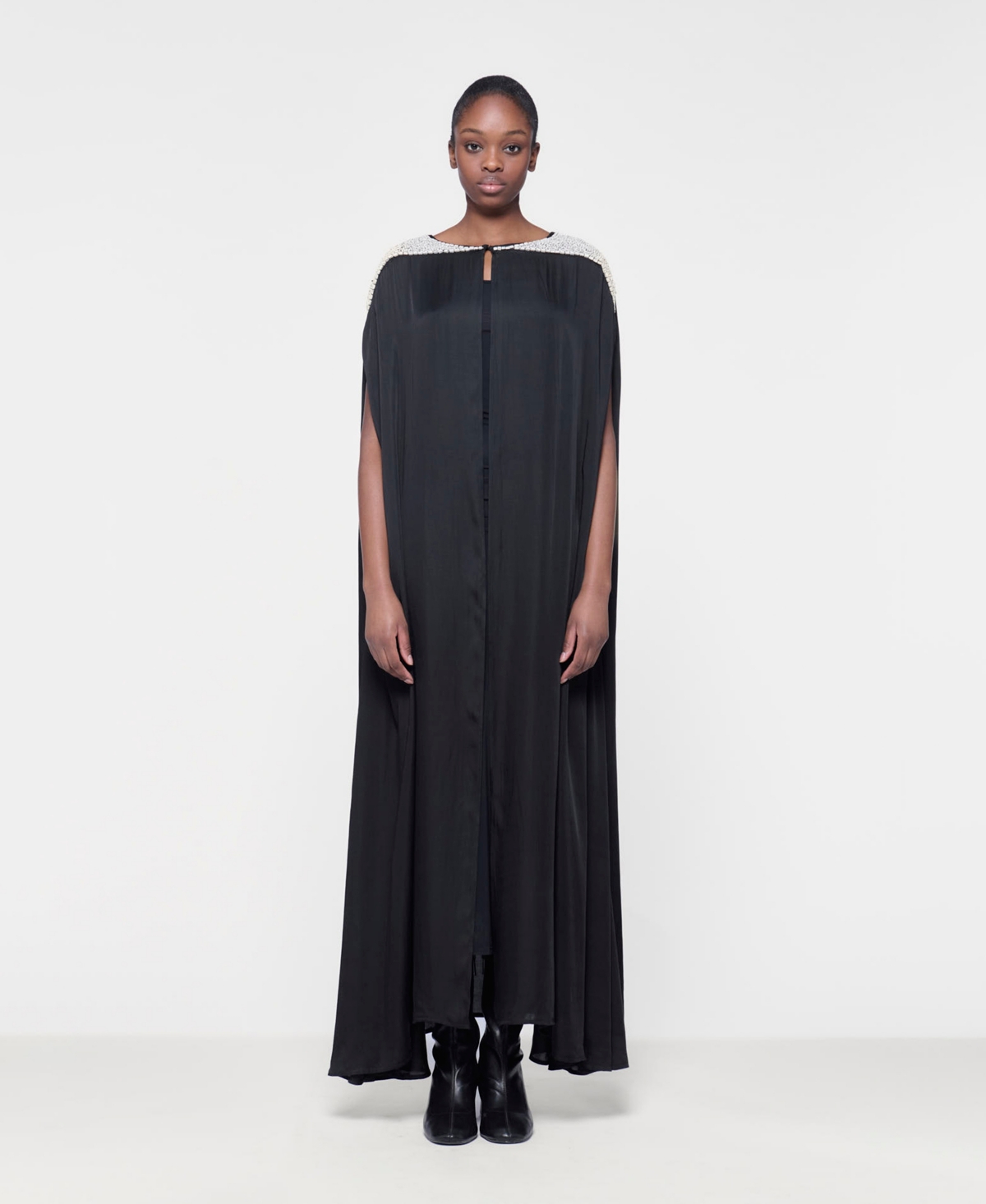 Click here for Leem Womens Jeweled Shoulder Cape - Black prices