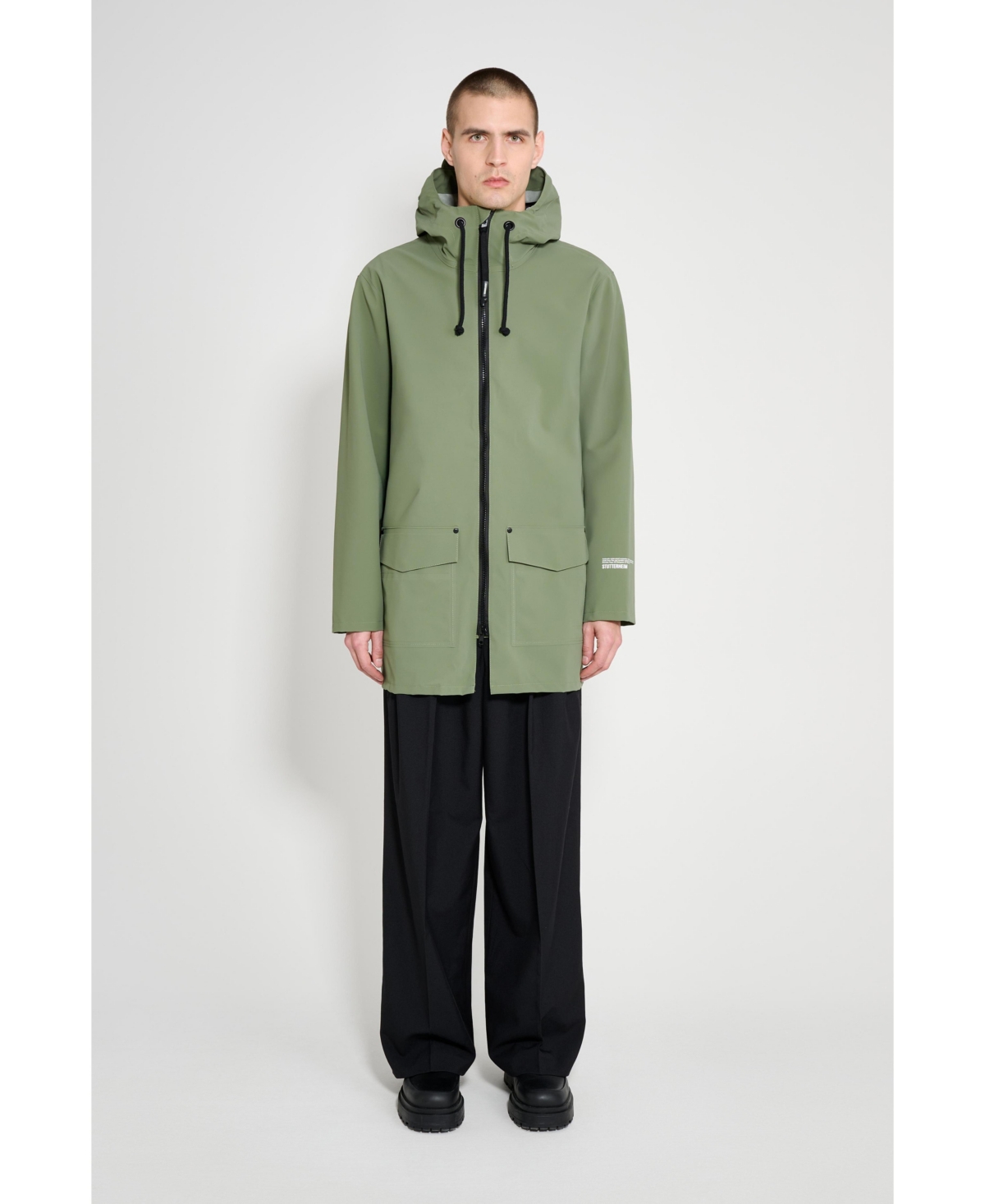 Click here for Stutterheim Mens Stockholm Patch Matte Raincoat -... prices