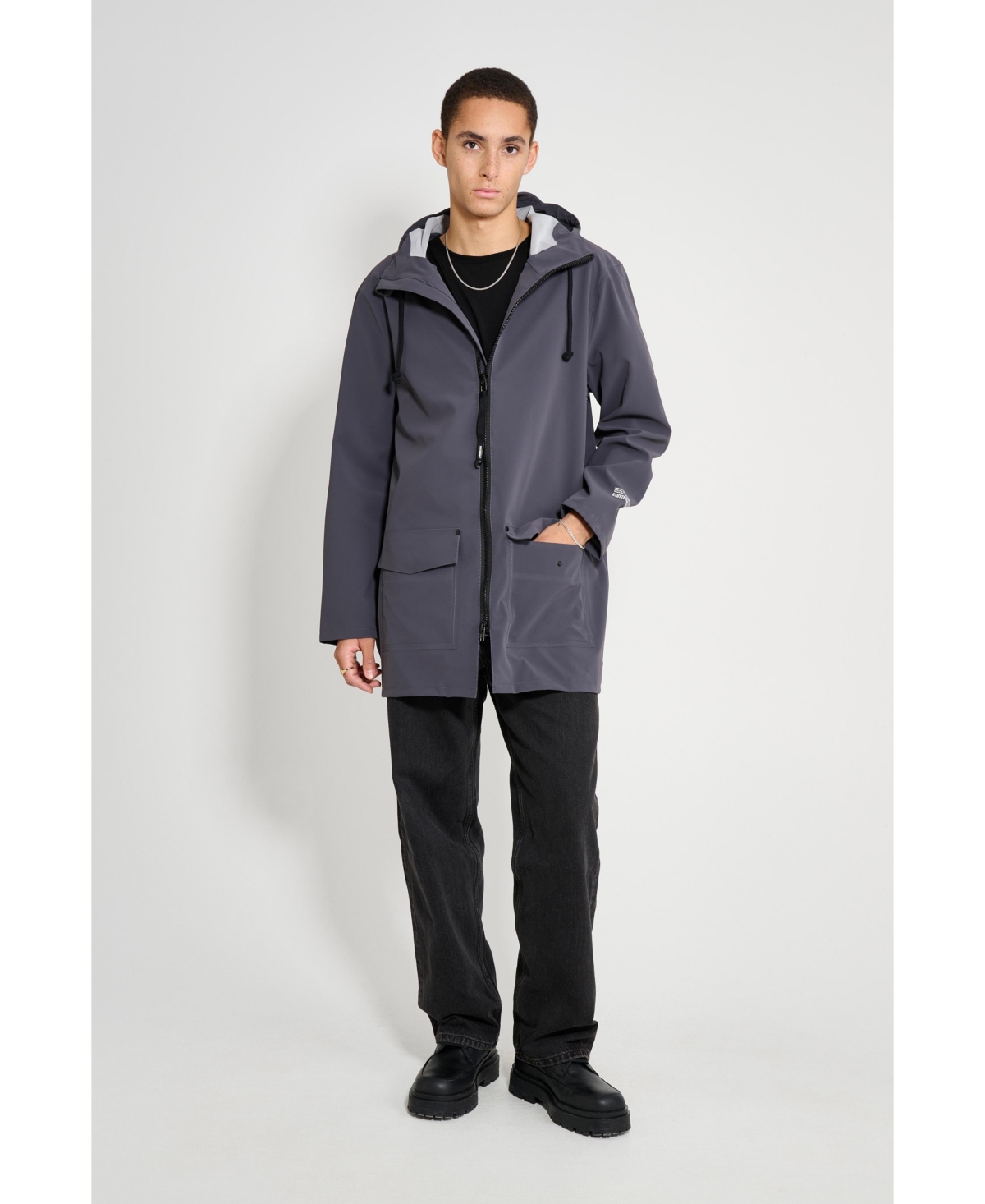 Click here for Stutterheim Mens Stockholm Patch Matte Raincoat -... prices