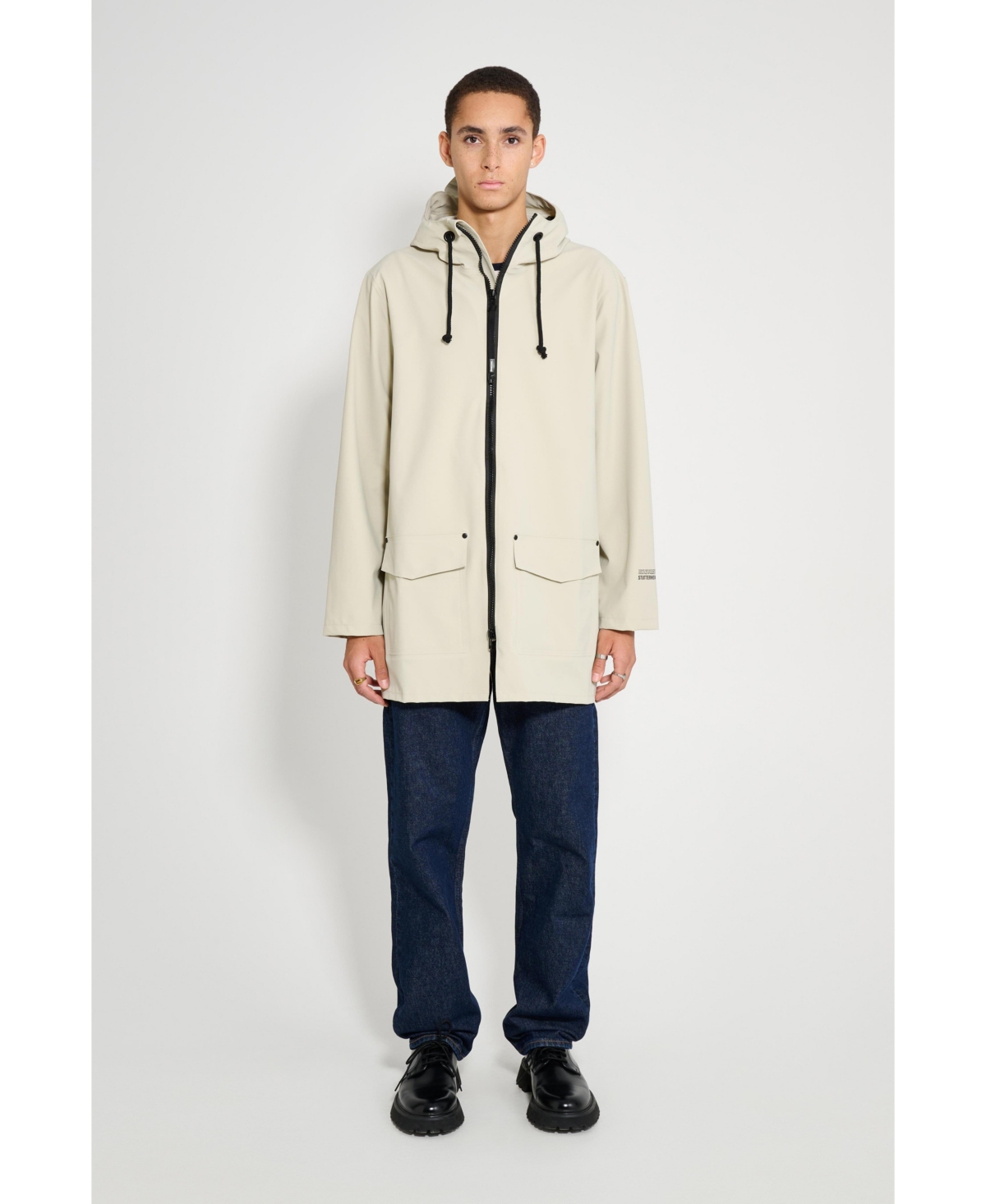 Click here for Stutterheim Mens Stockholm Patch Matte Raincoat -... prices