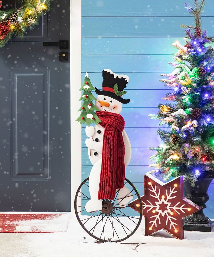 Glitzhome 32" H Metal Snowman Riding Bike Porch Decor - Macy's