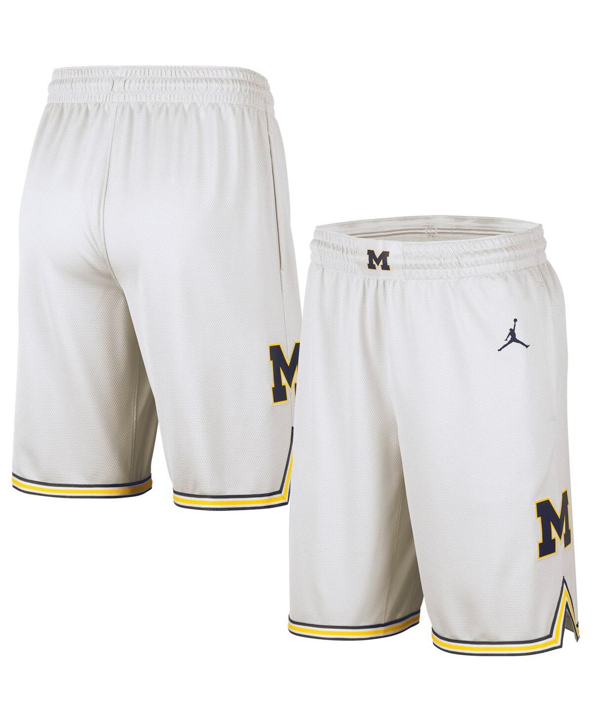 Click here for Jordan Mens White Michigan Wolverines Replica Team... prices