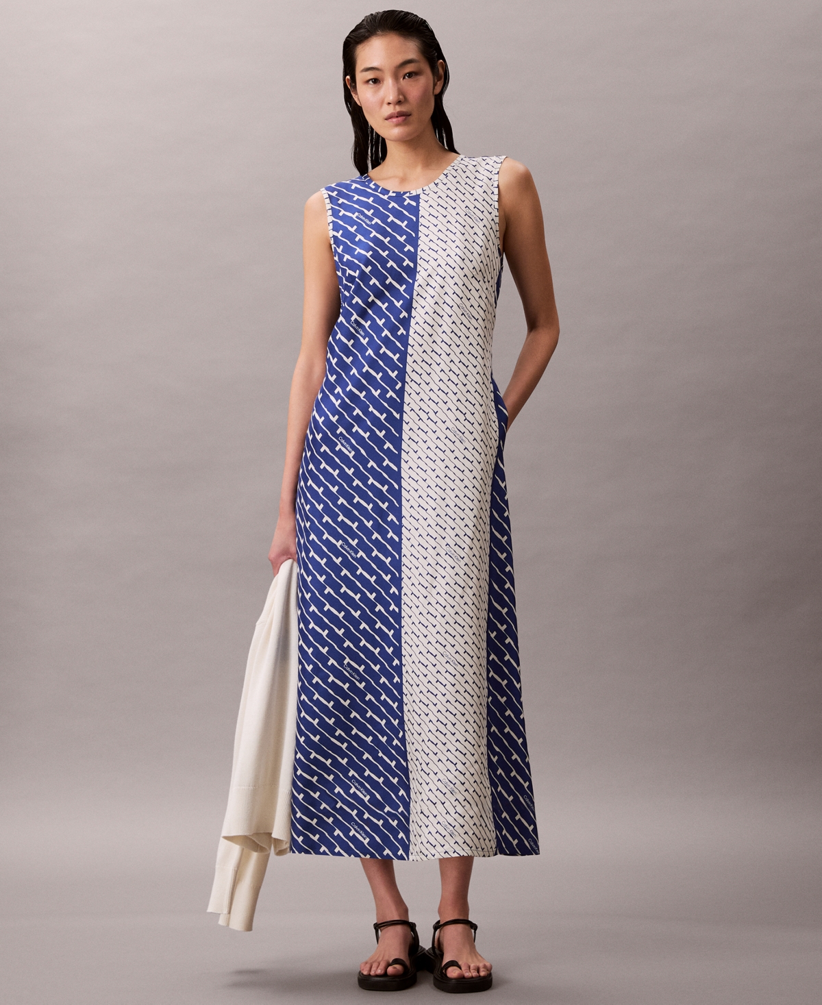 Click here for Calvin Klein Printed Color-Block Sleeveless Dress... prices