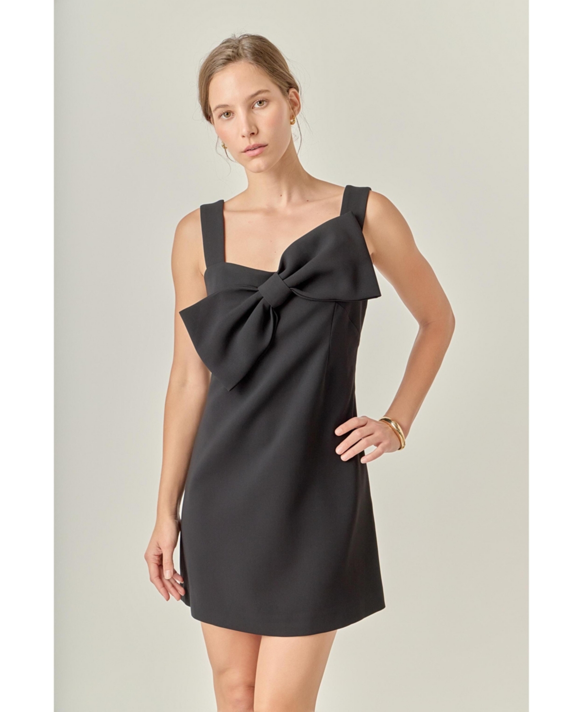 Click here for Womens Bow Sleeveless Mini Dresss prices