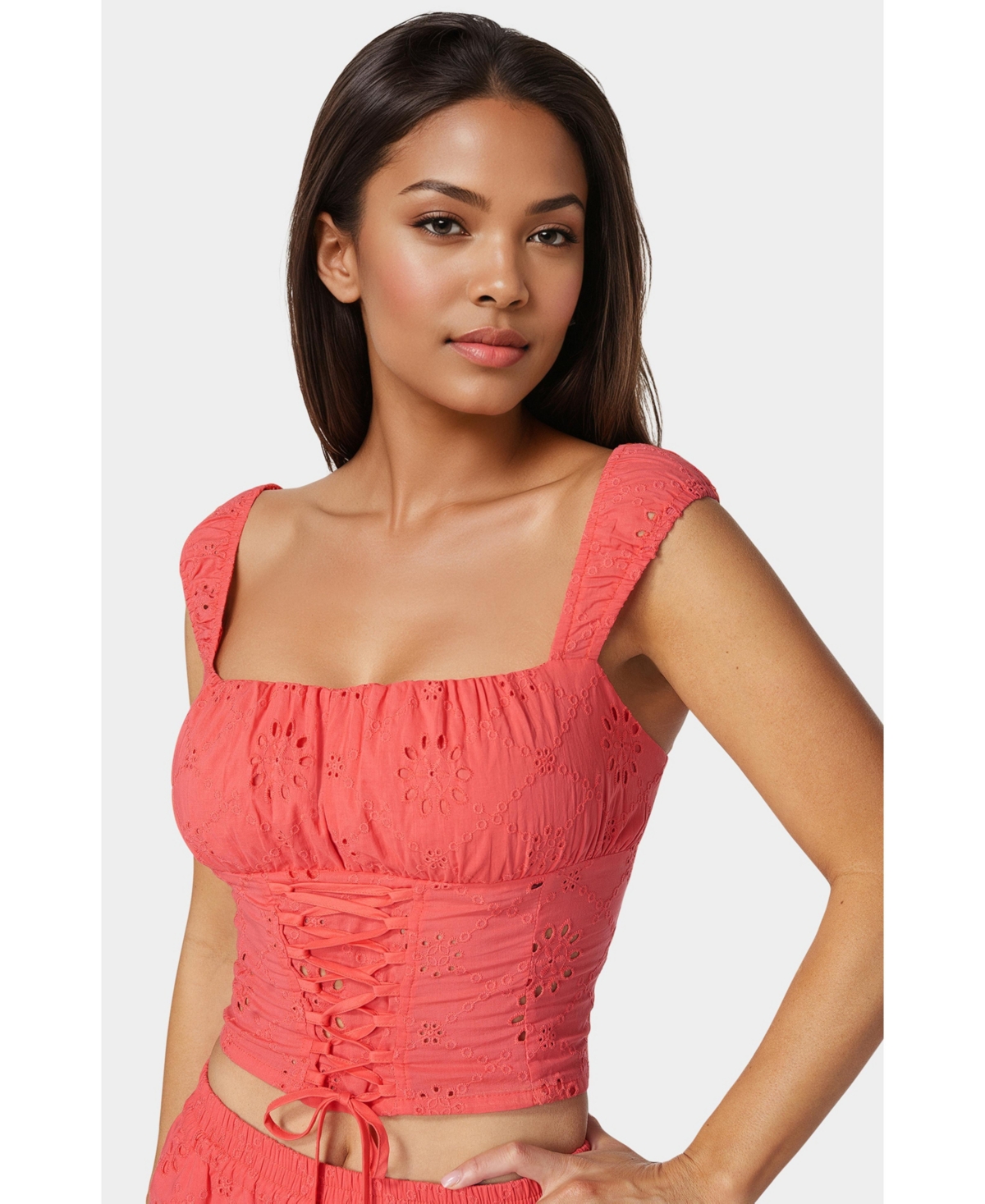 Click here for Bebe Womens Eyelet Lace Up Corset - Calypso coral prices