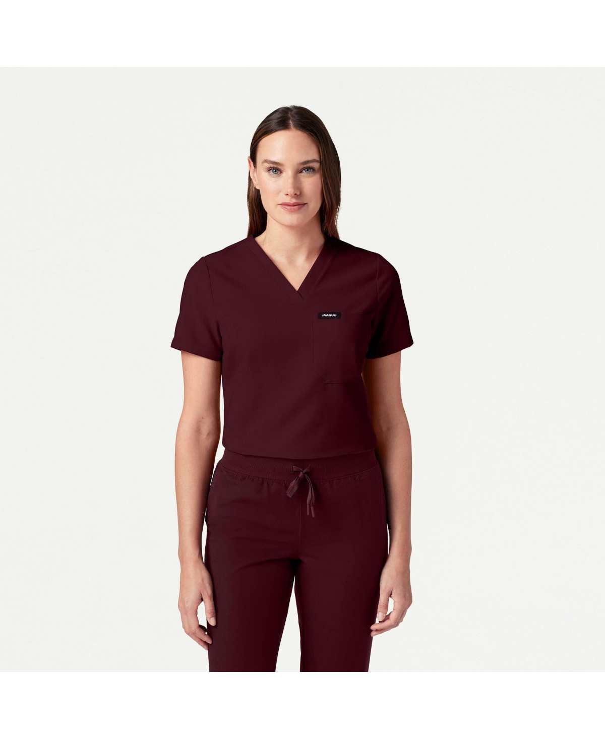 Click here for Jaanuu Womens Rhena 1-Pocket Slim V-Neck Scrub Top... prices