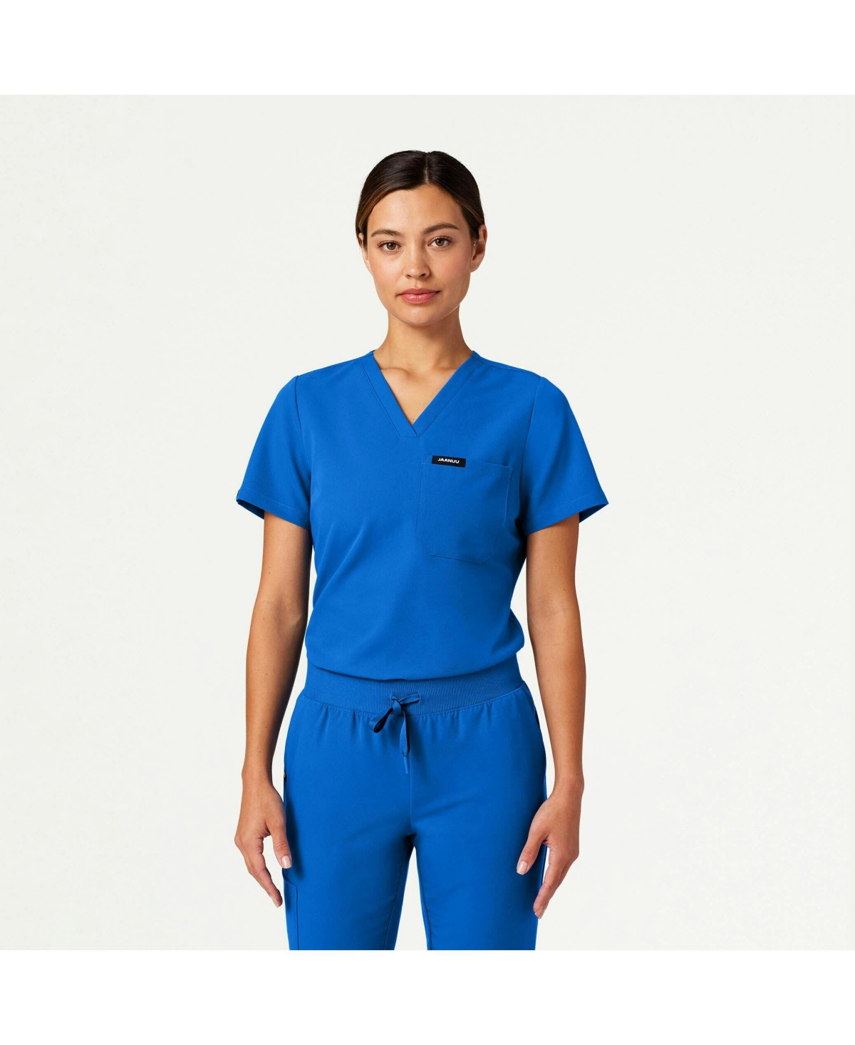 Click here for Jaanuu Womens Rhena 1-Pocket Slim V-Neck Scrub Top... prices
